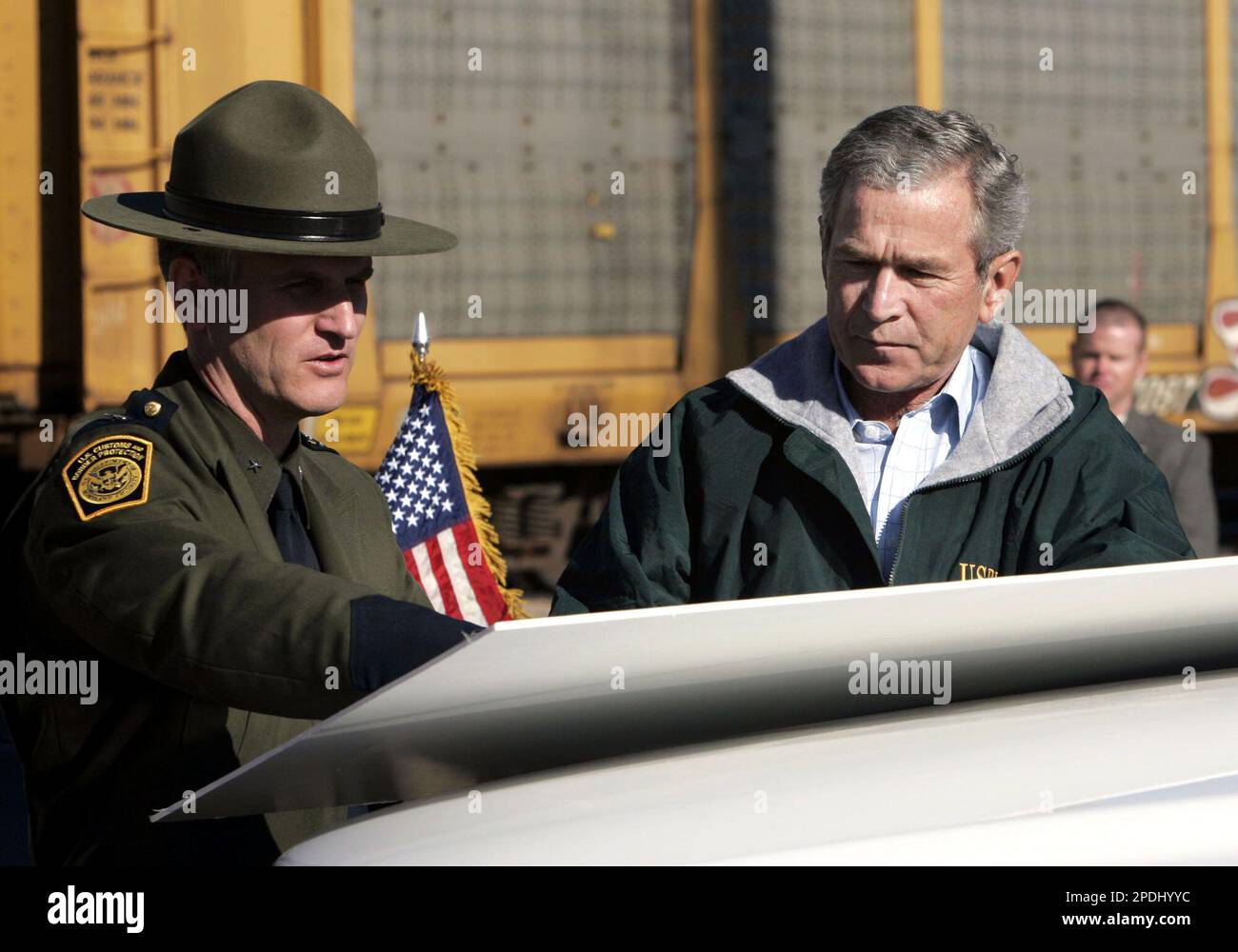 President Bush is shown a map of the El Paso Sector of the US/Mexico ...
