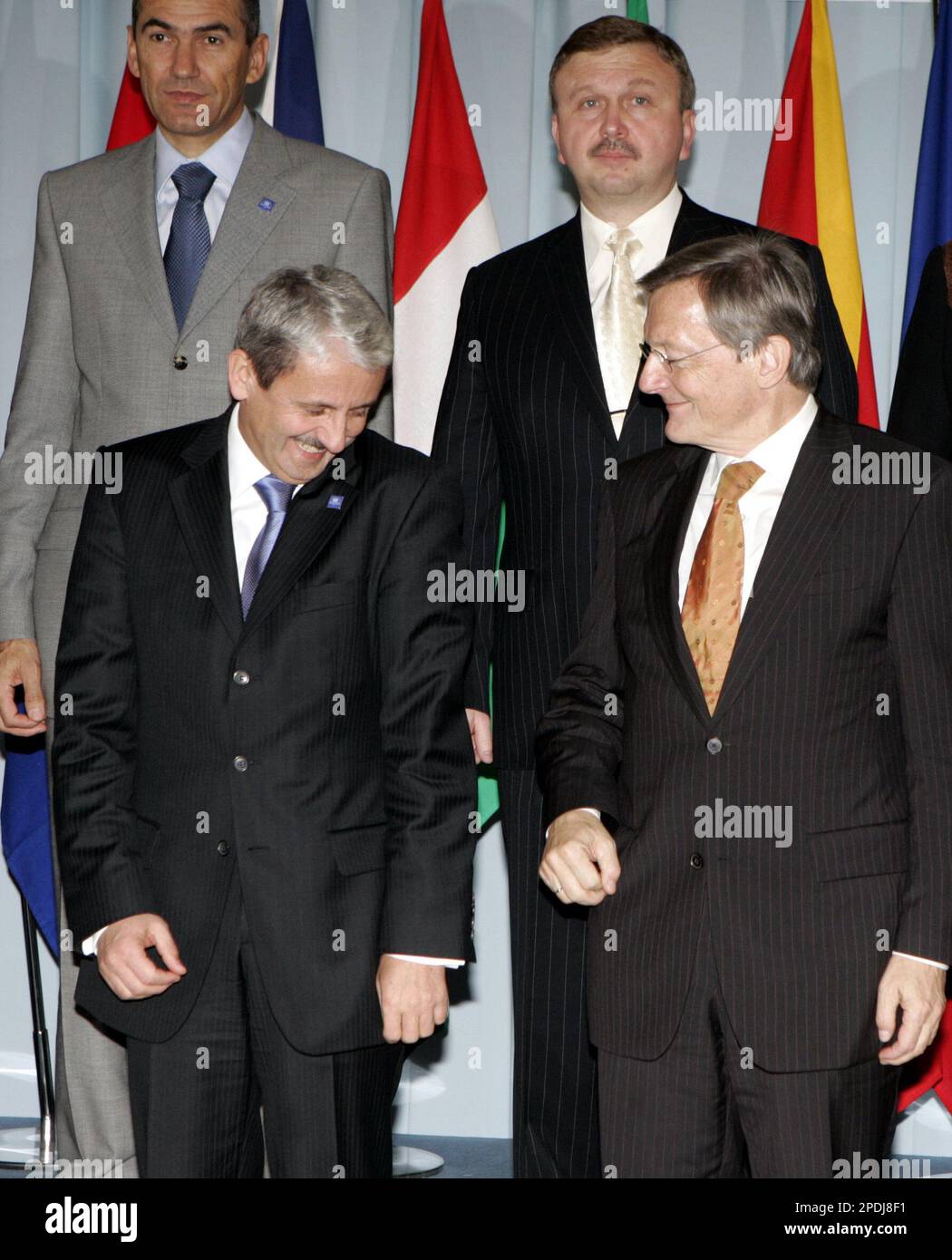 Slovakian Prime Minister Mikulas Dzurinda, bottom left, shares a ...