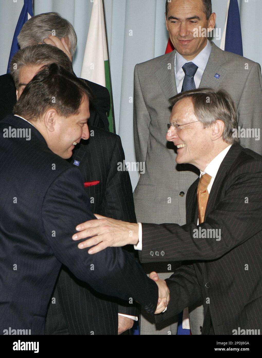 Austrian Chancellor Wolfgang Schuessel, bottom right, shakes hands with ...