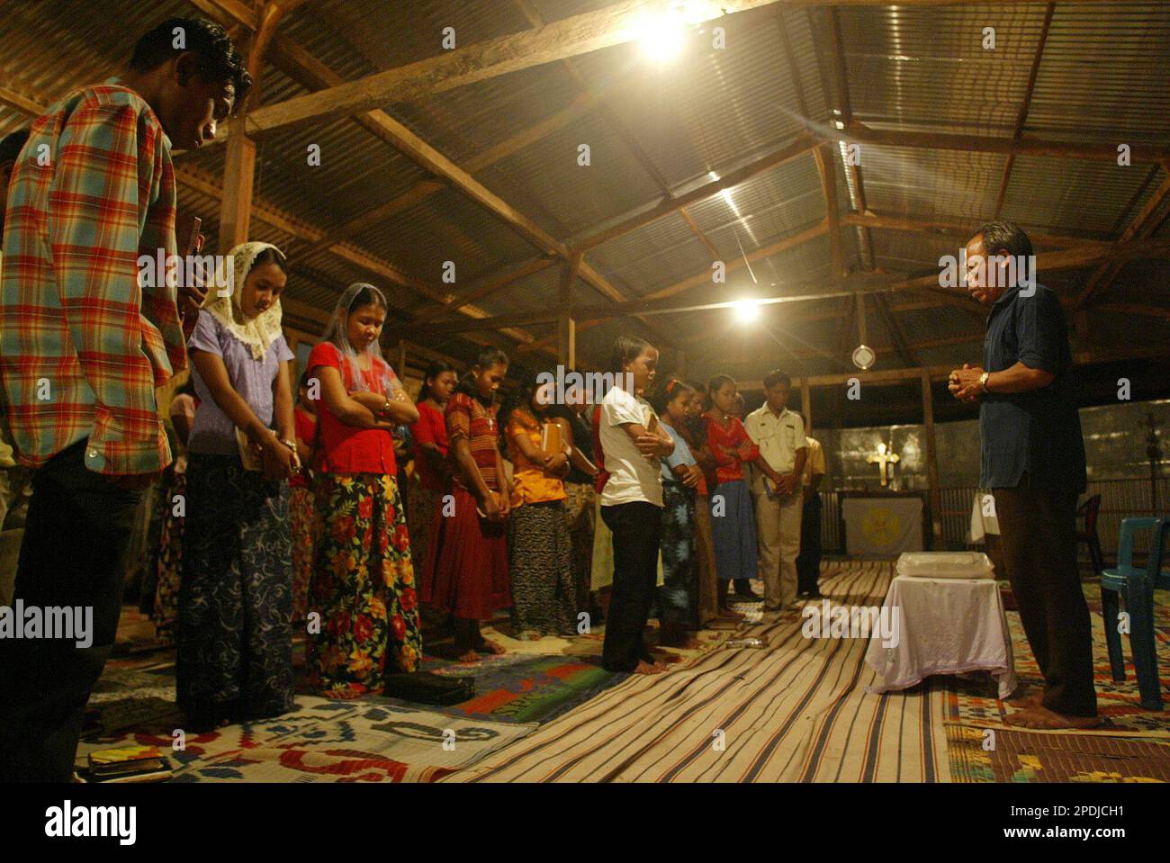 Nicobarese pray in St. Paul's Church in Perka village in Car Nicobar ...