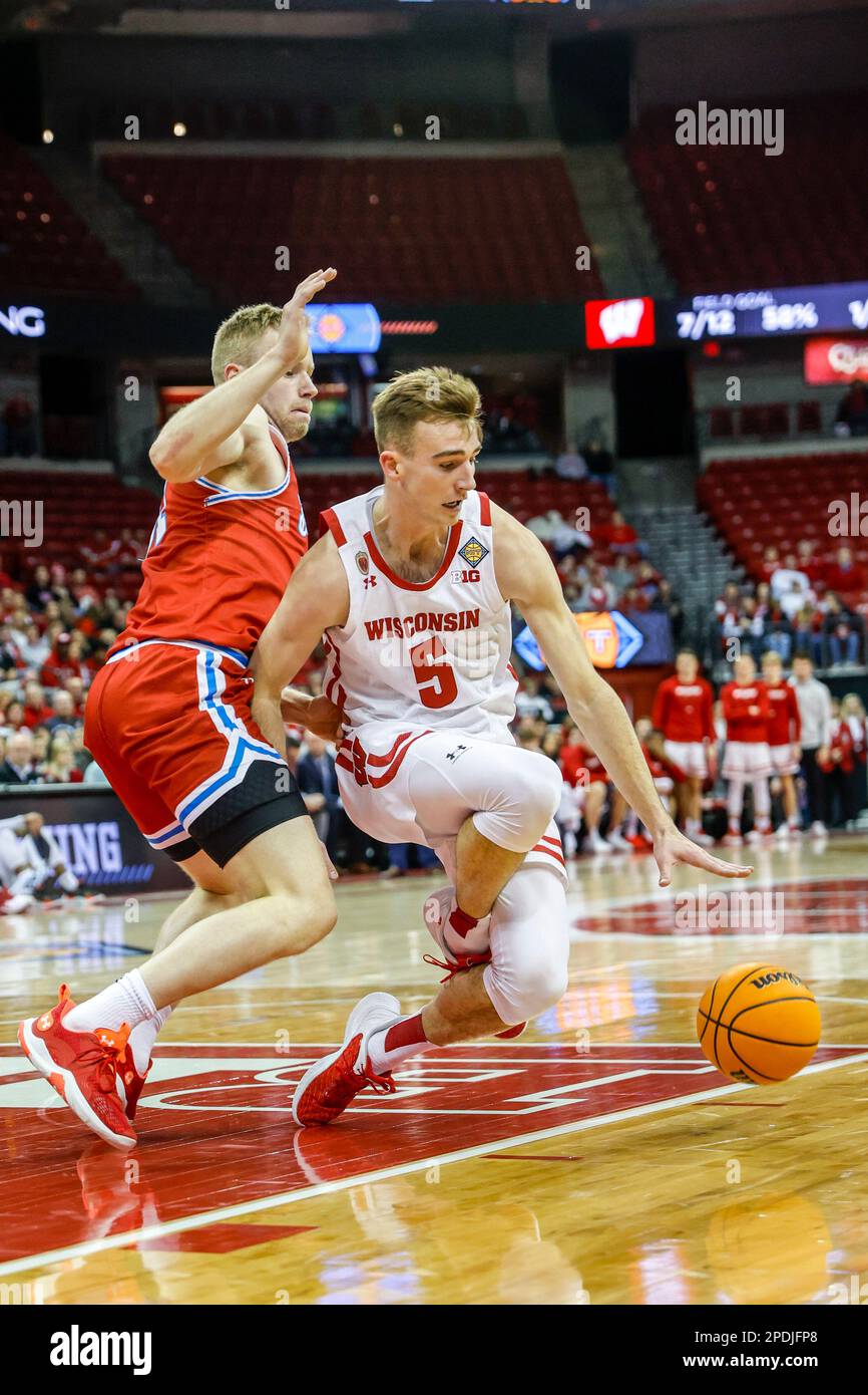 MADISON, WI - MARCH 14: Wisconsin forward Tyler Wahl (5) gets knocked ...