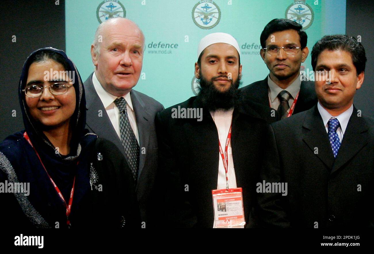 Britain's Secretary of State for Defence John Reid, second left, poses ...