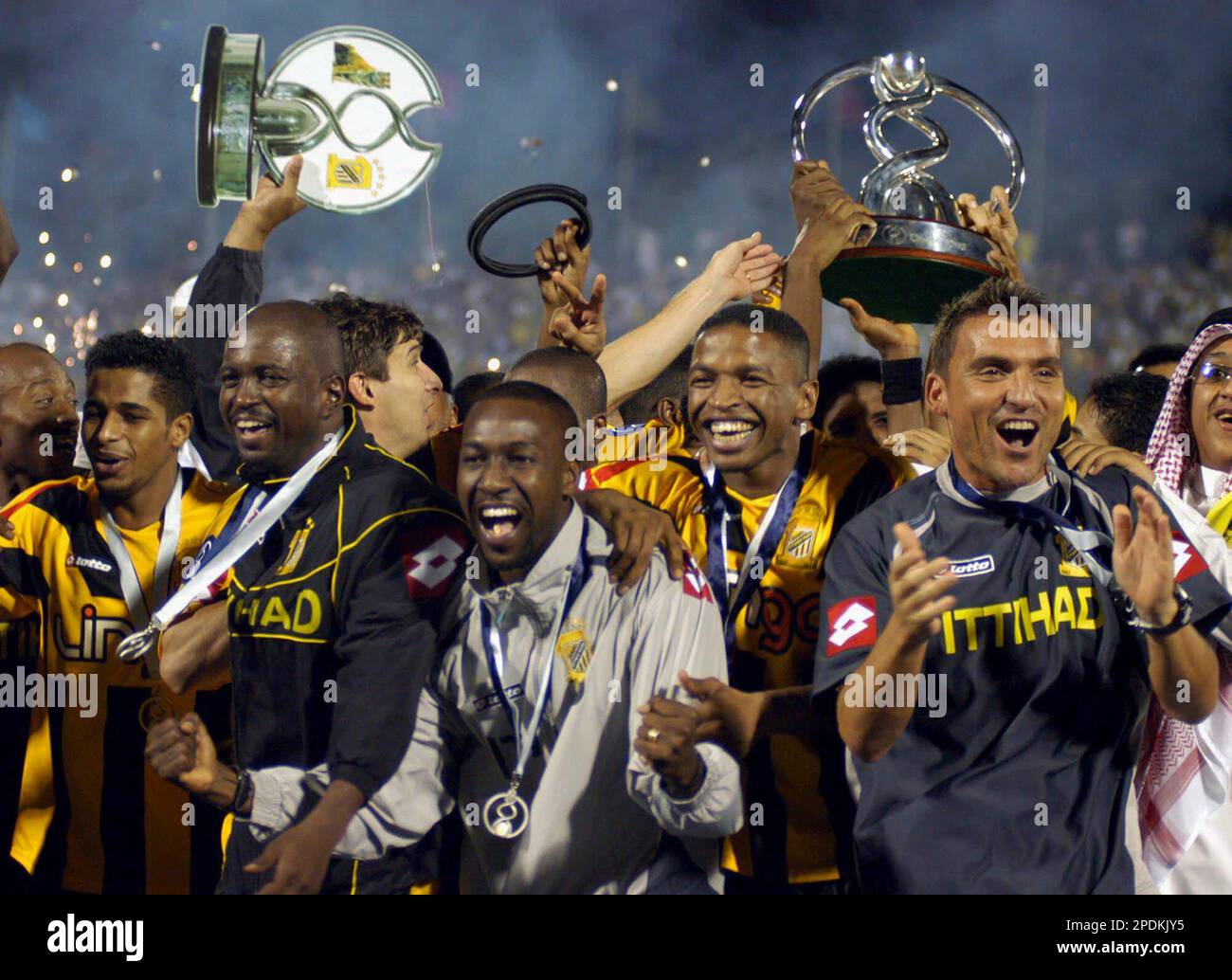 Saudi Arabia's Al Ittihad players celebrate after winning the AFC ...