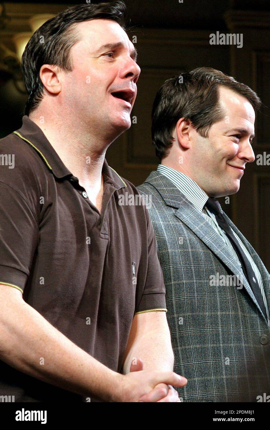 Nathan Lane, left, and Matthew Broderick look out onto the audience ...