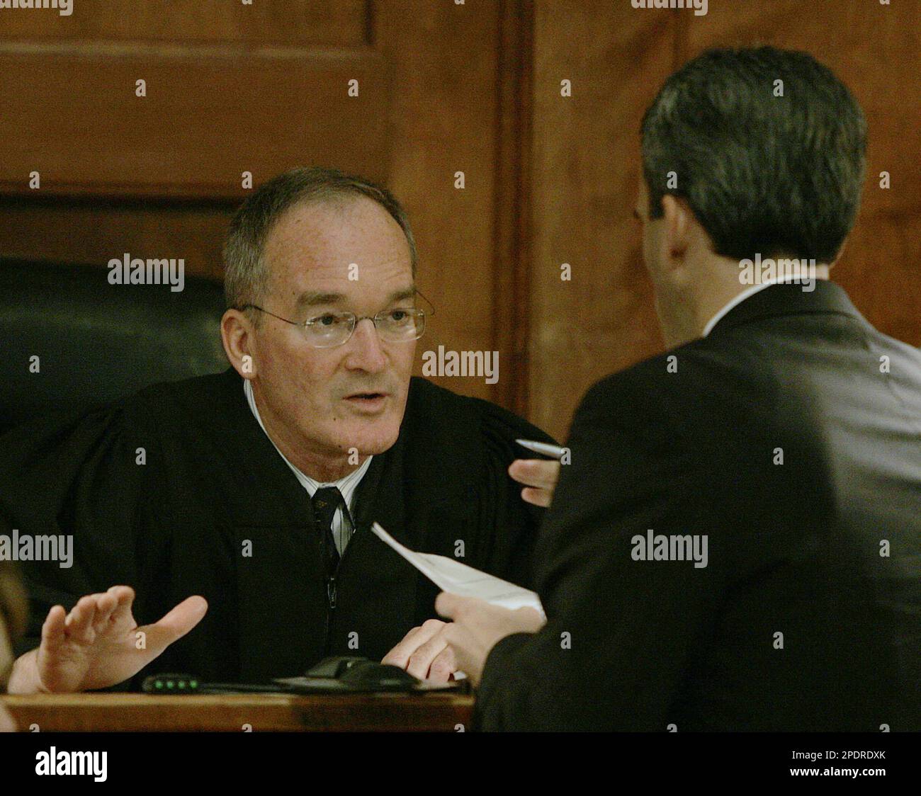 Franklin County Circuit Judge William Graham, left, talks with ...