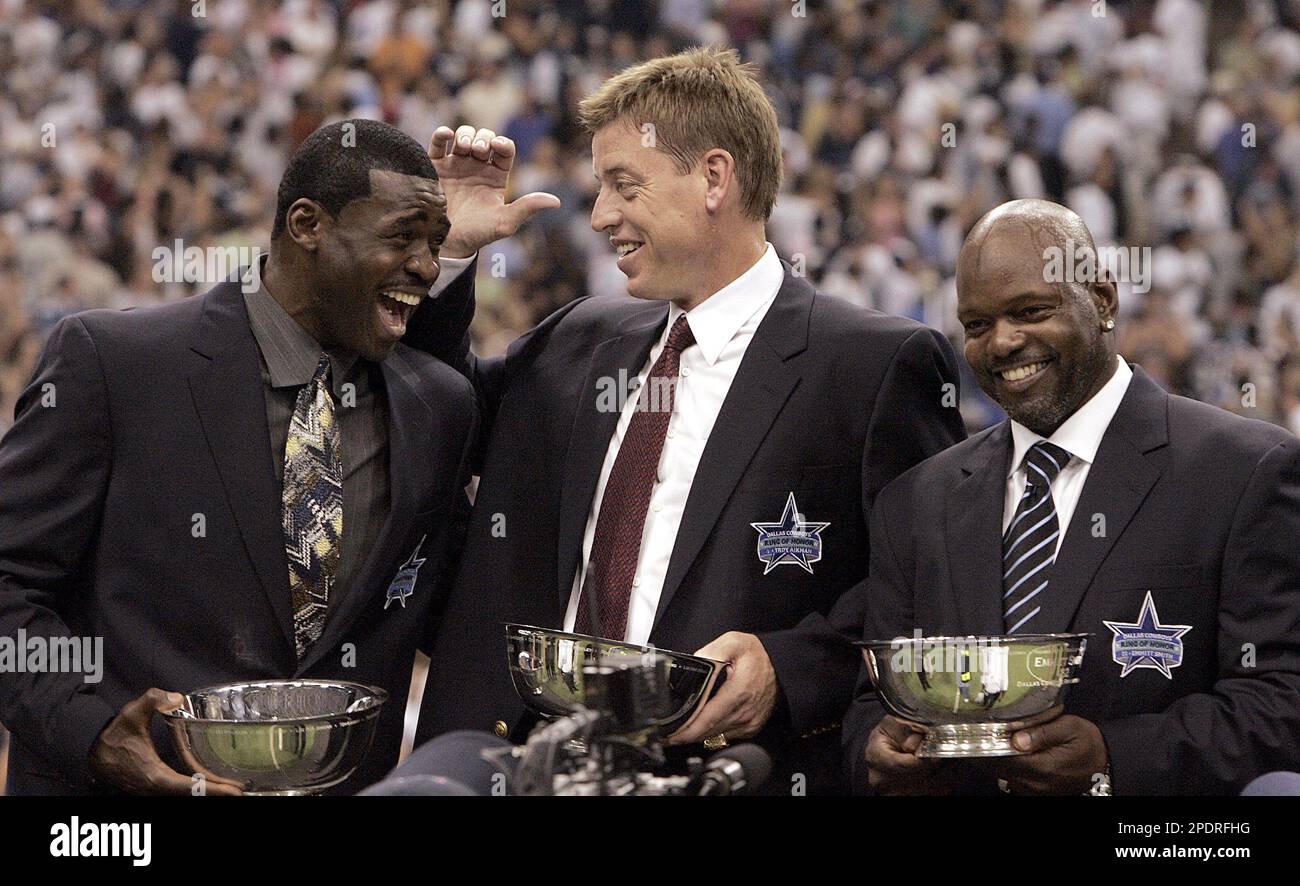 Former Dallas Cowboys players, from left, Michael Irvin, Troy Aikman ...
