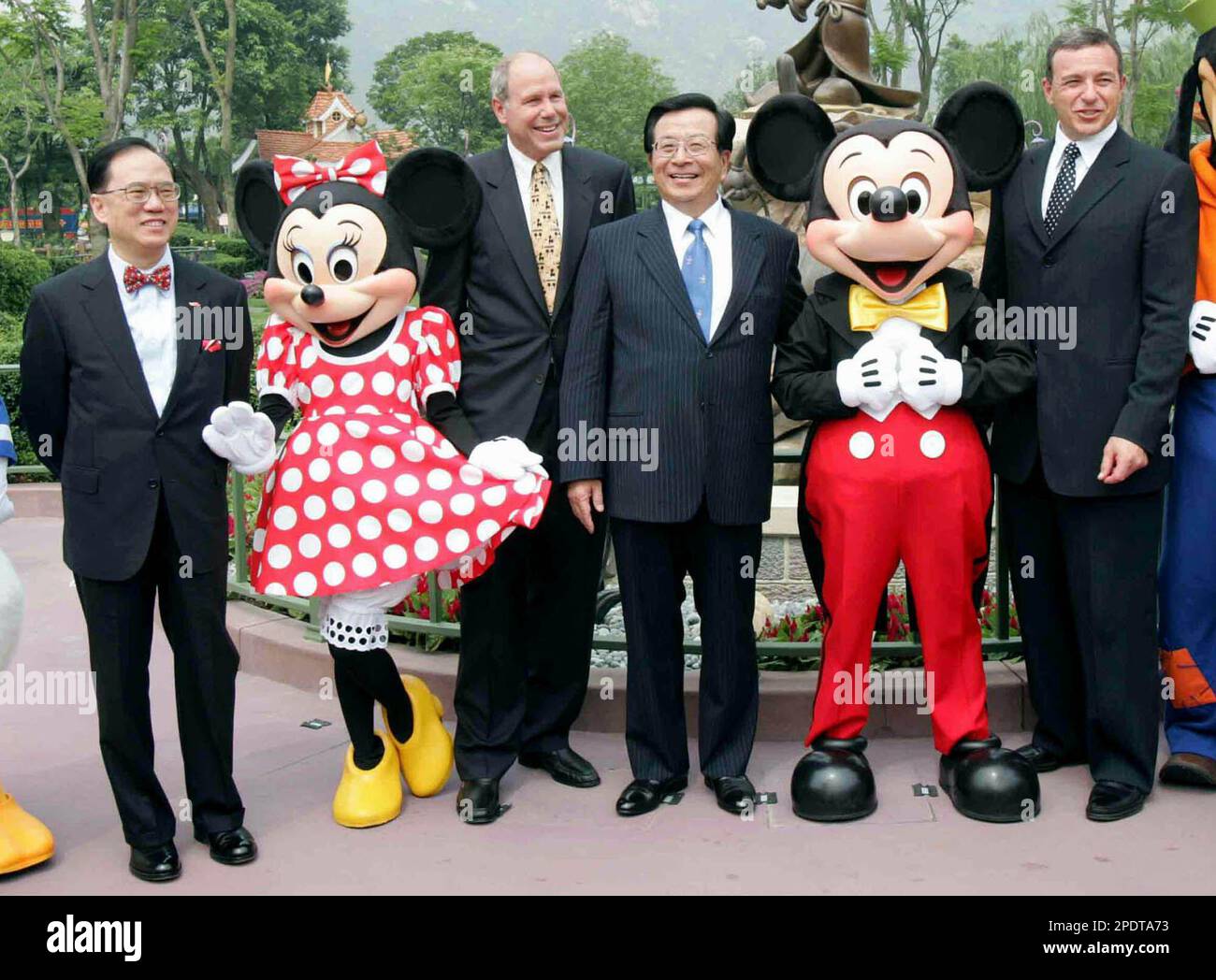 Hong Kong Chief Executive Donald Tsang, left, Walt Disney Company CEO ...