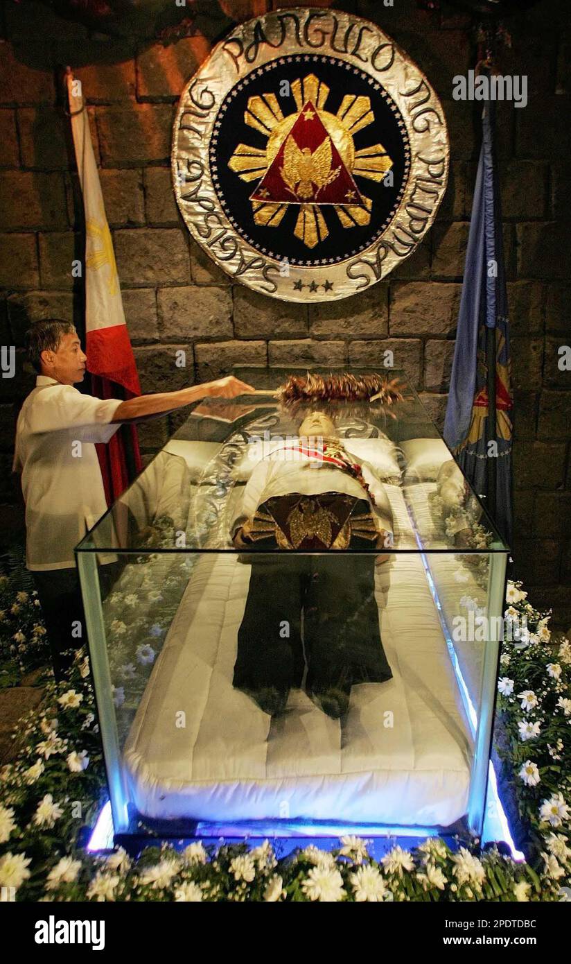 A caretaker cleans the refrigerated crypt of the late strongman ...