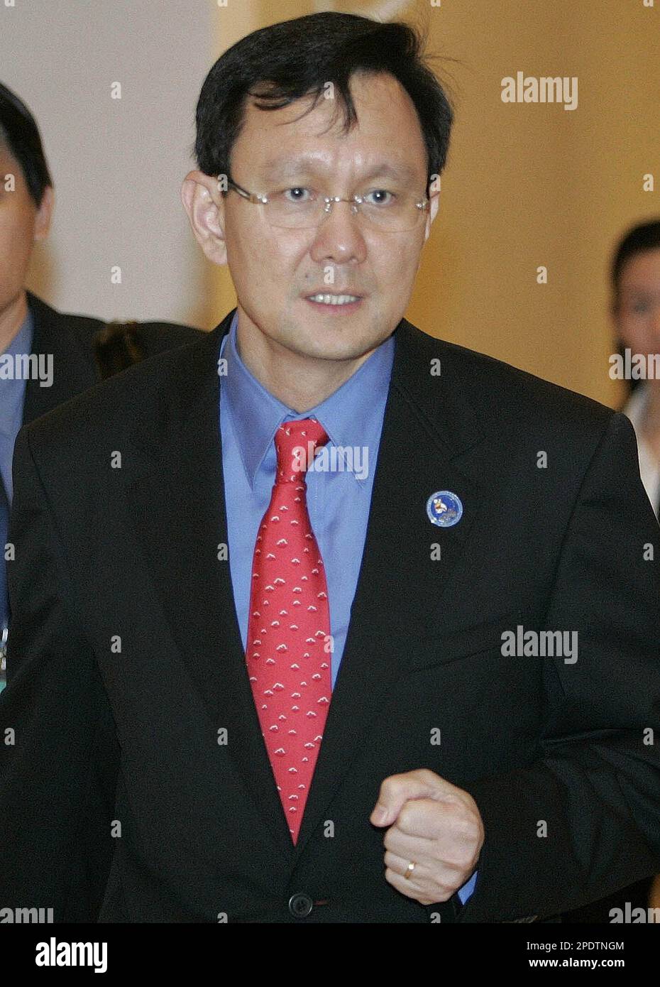 Singapore's second minister for finance Raymond Lim Siang Keat walks to meet to South Korean ...