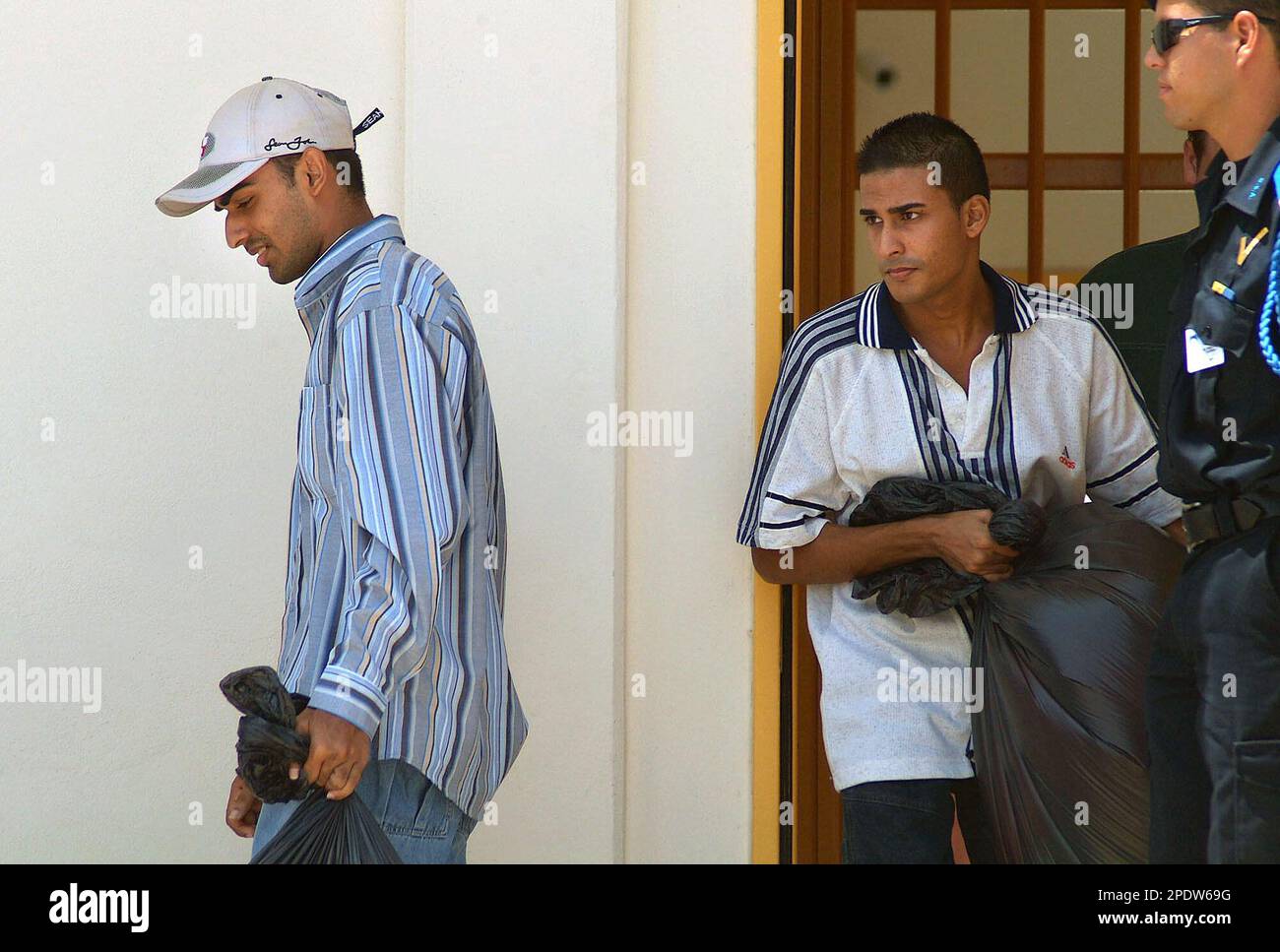 Surinam citizens Satish Kalpoe, 21, left, and his brother Deepak, 18 ...