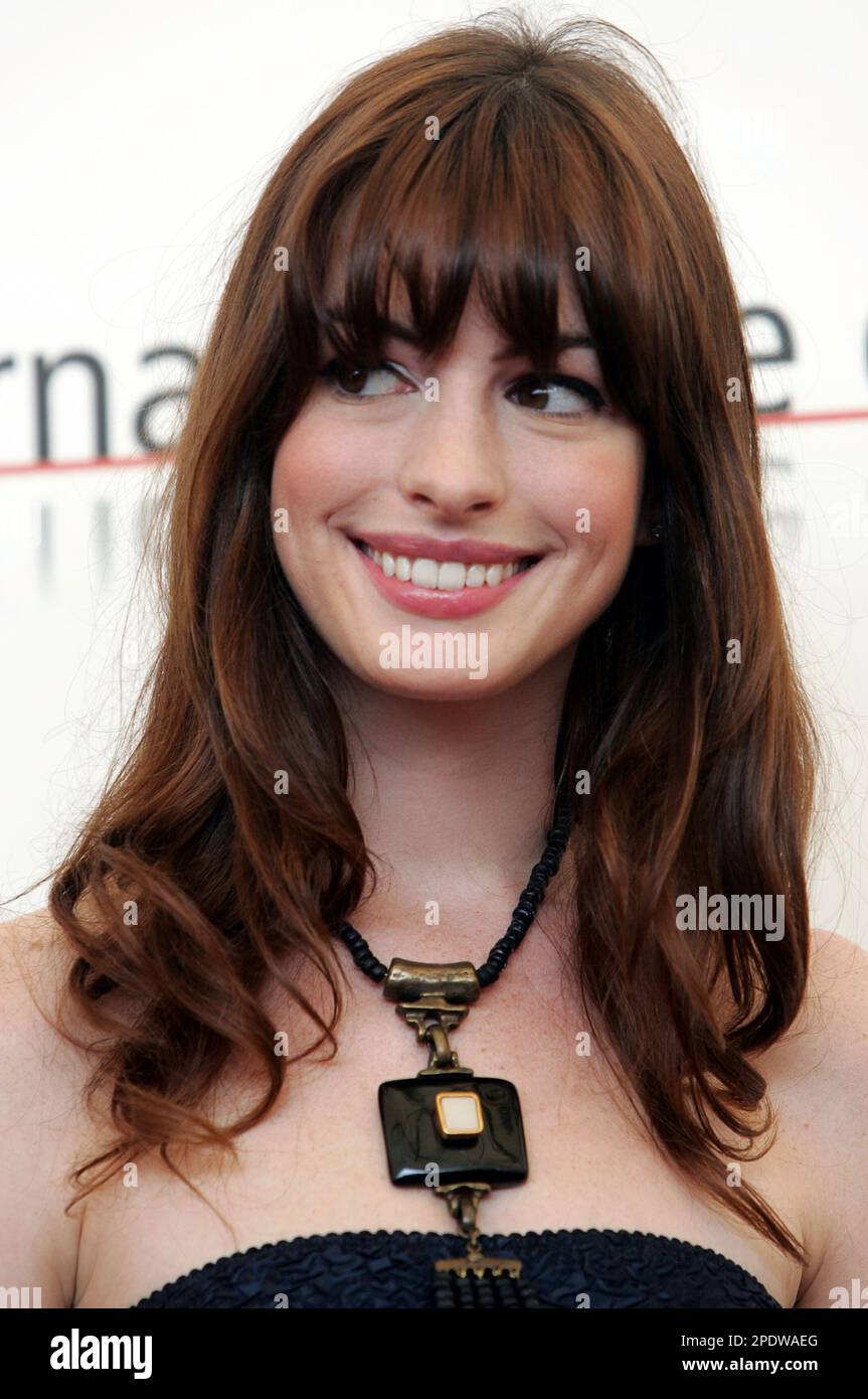 US actress Anne Hathaway poses for photographers after a press ...