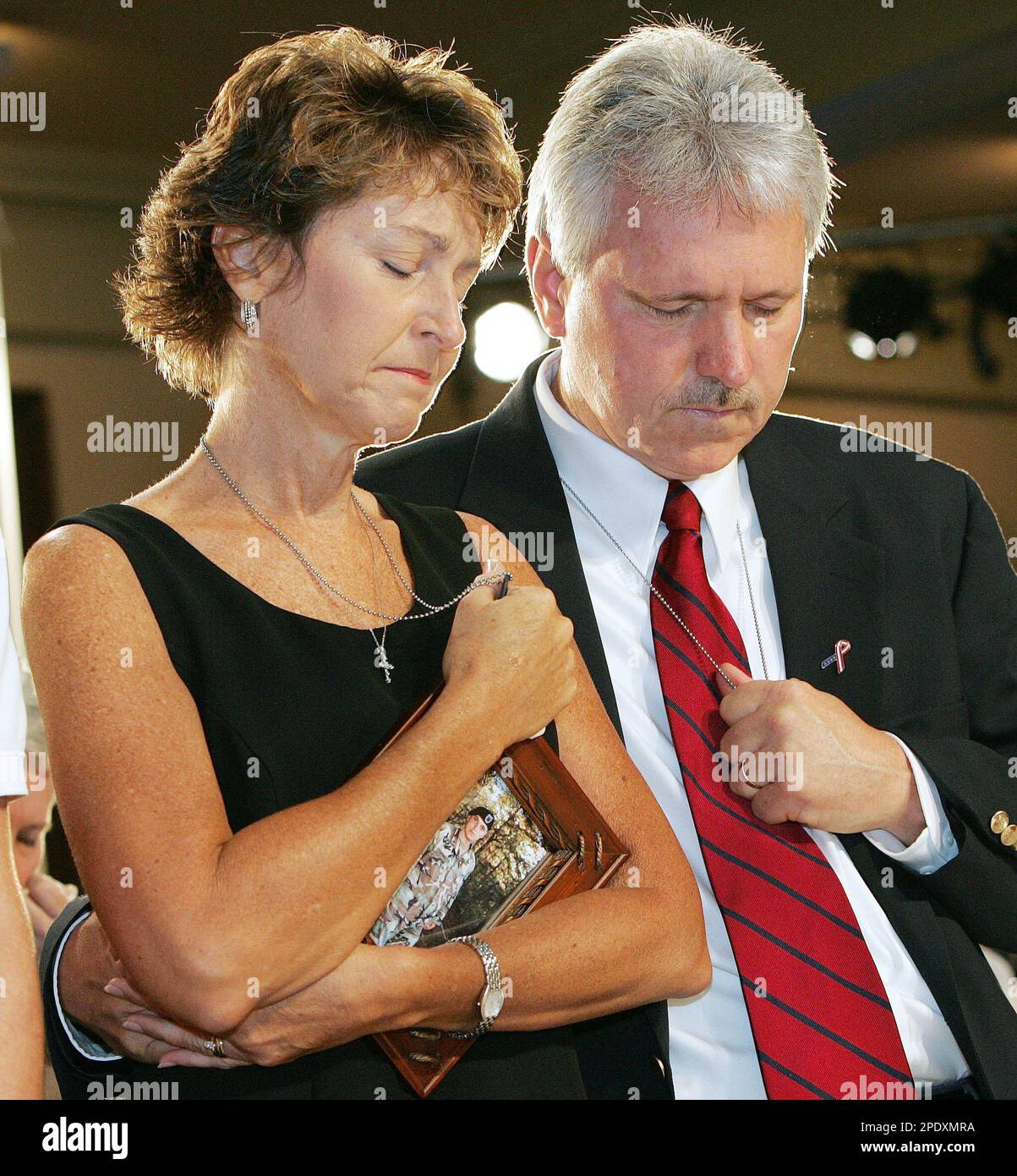 Robert Stokely, right, father of National Guard Spc. Michael Stokely ...