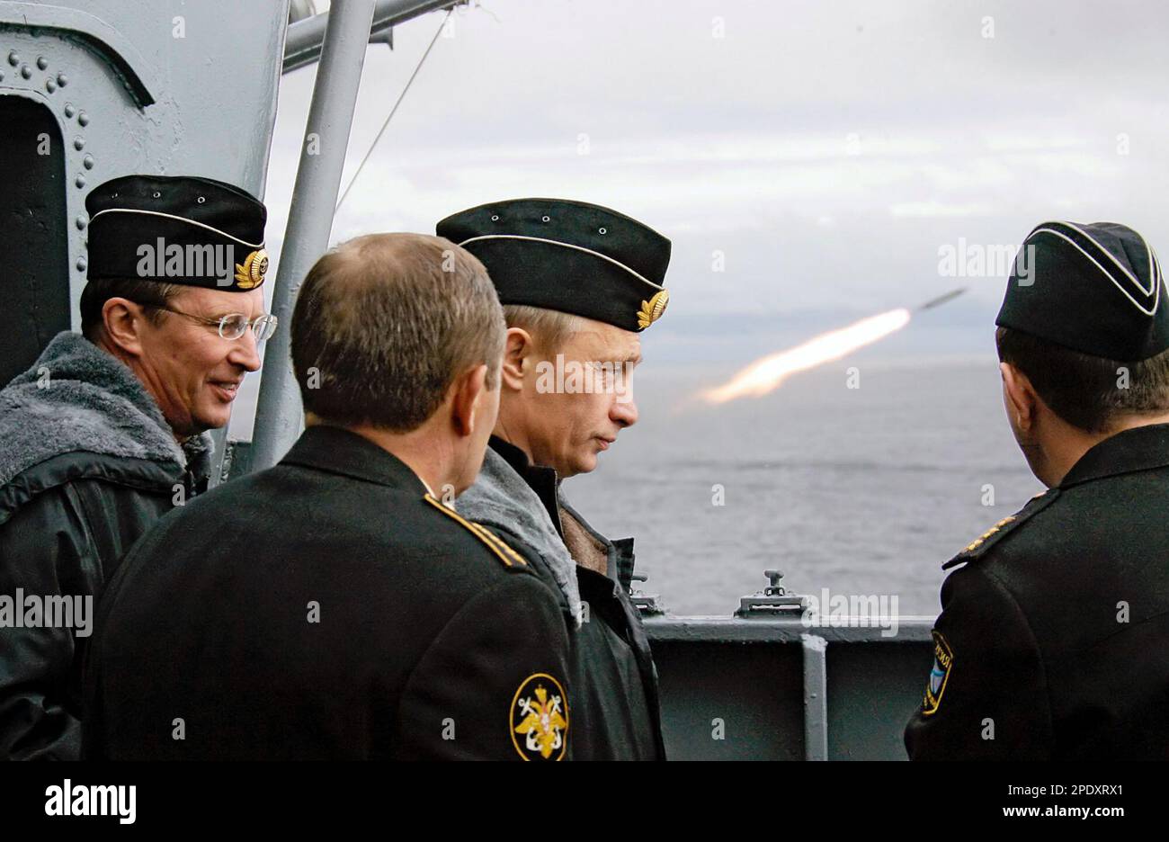 Wearing sailor's uniform Russian Defense Minister Sergei Ivanov, left ...