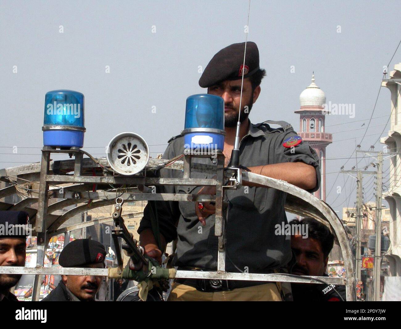 Pakistani police officers patrol in Peshawar, Pakistan to ensure ...