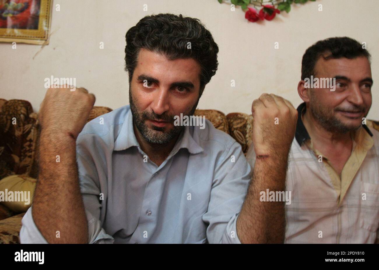 Released hostage, dual Syrian-Lebanese citizen Atta Ibrahim, left ...