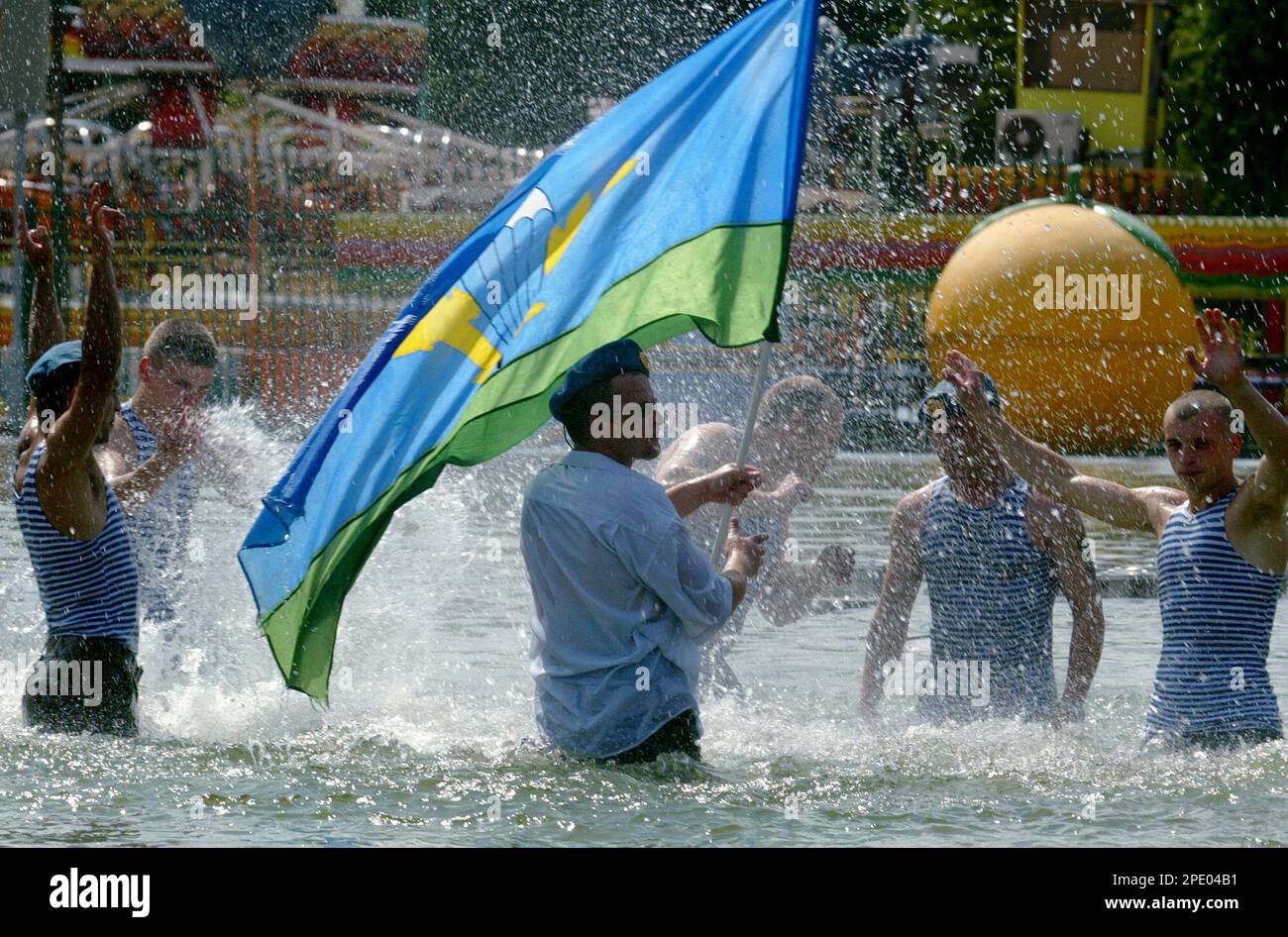 Former Russian army paratroopers, who wear thier uniform of blue berets ...