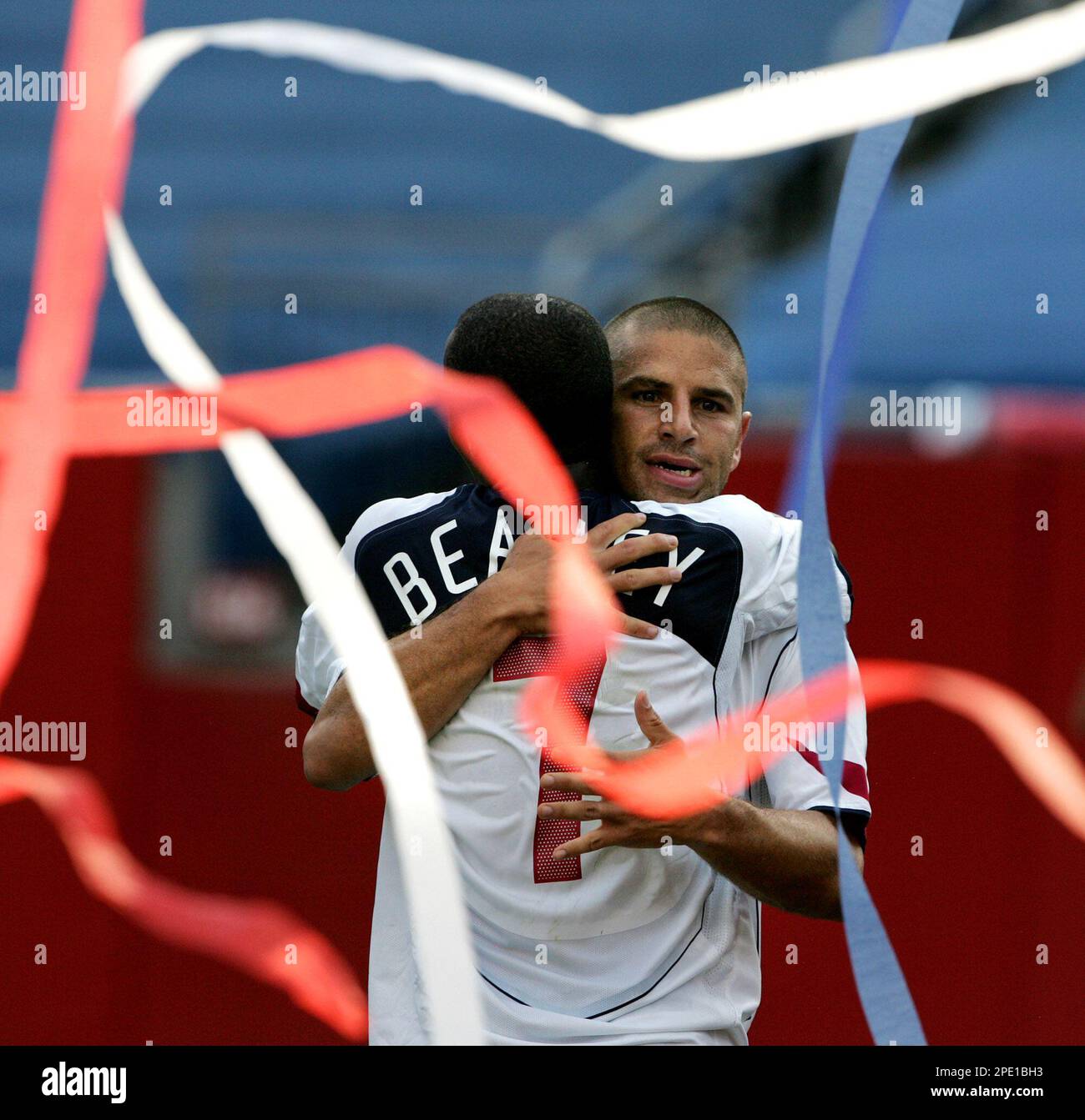 As red, white and blue streamers fly through the air, USA's DaMarcus ...