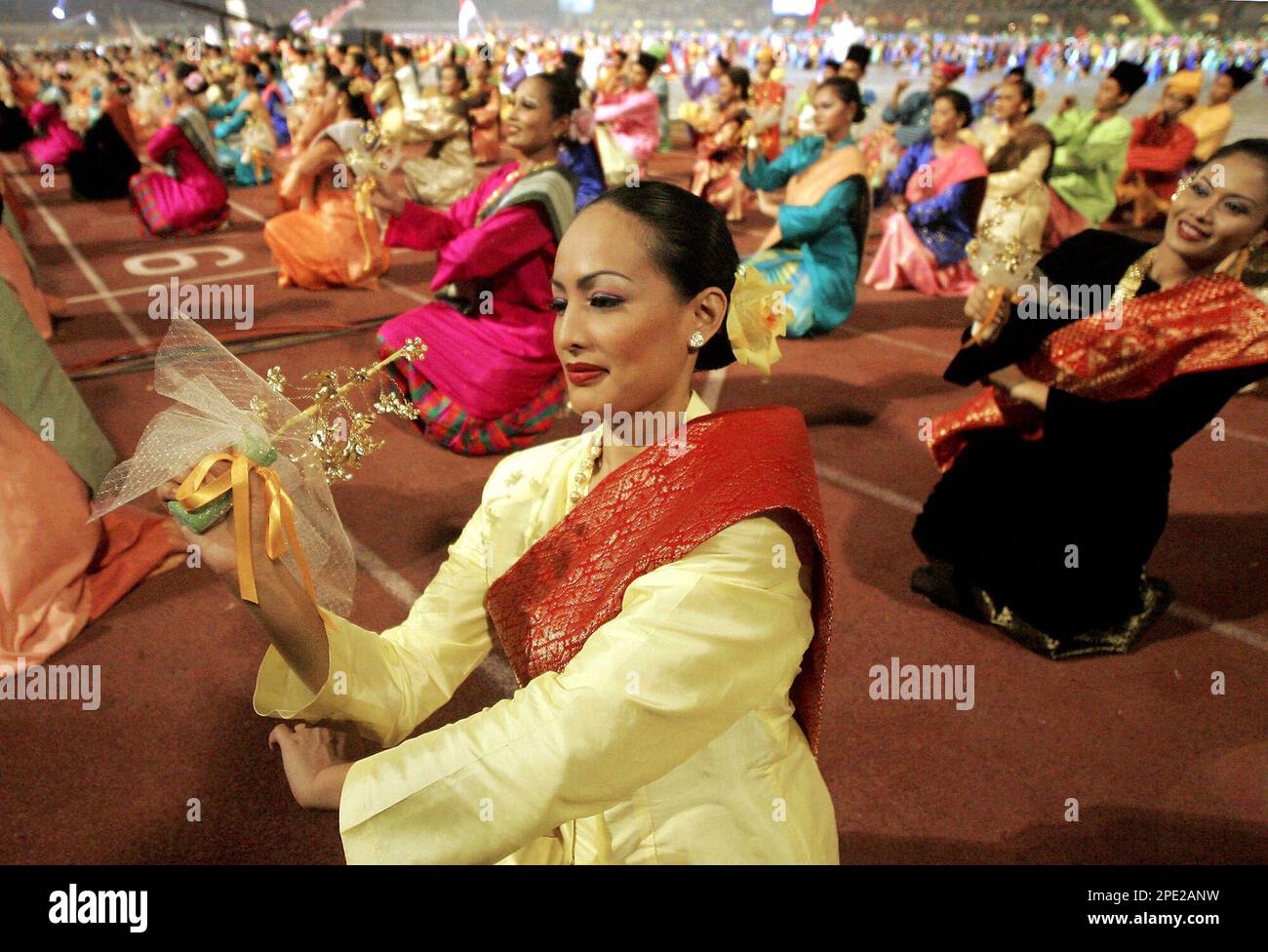 Dancer performs traditional 'Zapin' dance during the Citrawarna ...
