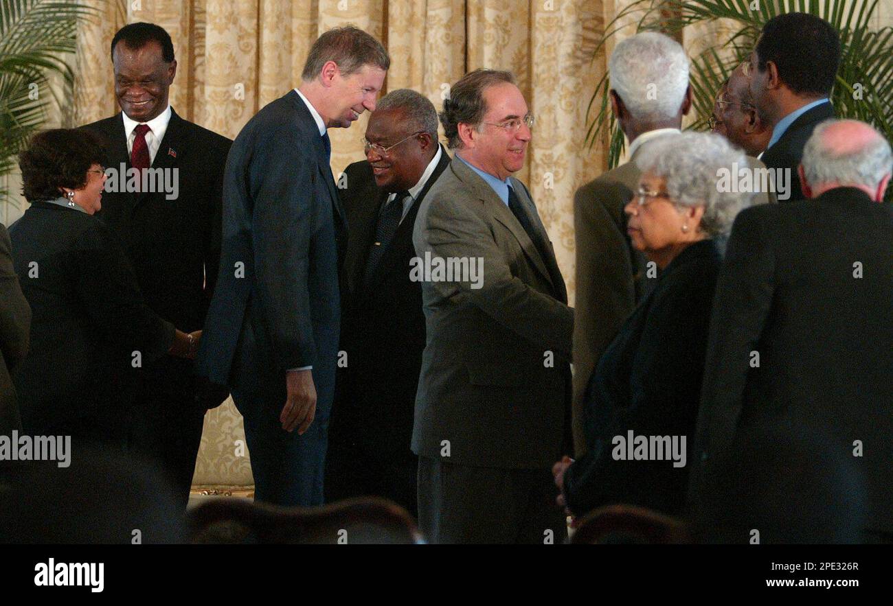 Haiti's interim President Boniface Alexandre, left (facing forward), U ...