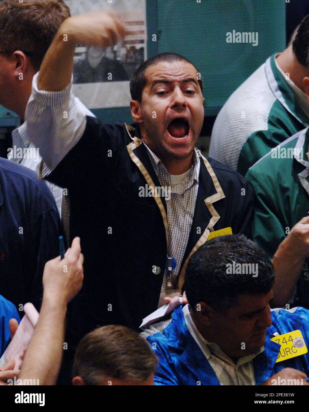 A trader in the oils futures pit of the New York Mercantile Exchange ...