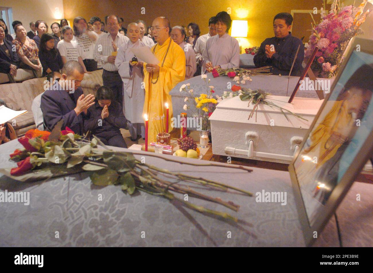 Thich Minh Duc, center, in yellow, of the Phuoc Long Buddhist Temple of ...
