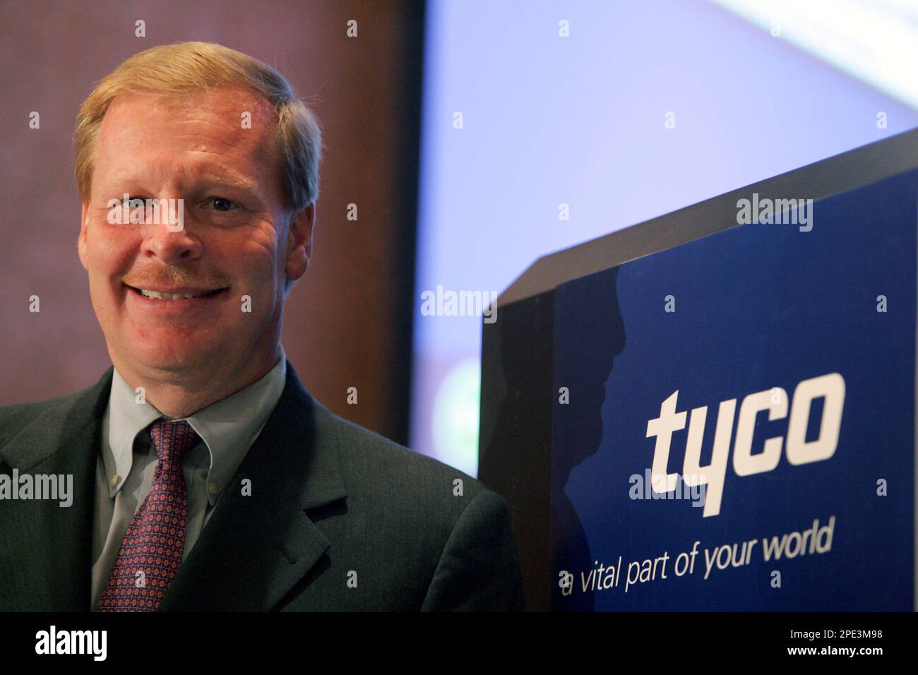 Tyco CEO Ed Breen poses for photographers after a presentation to ...