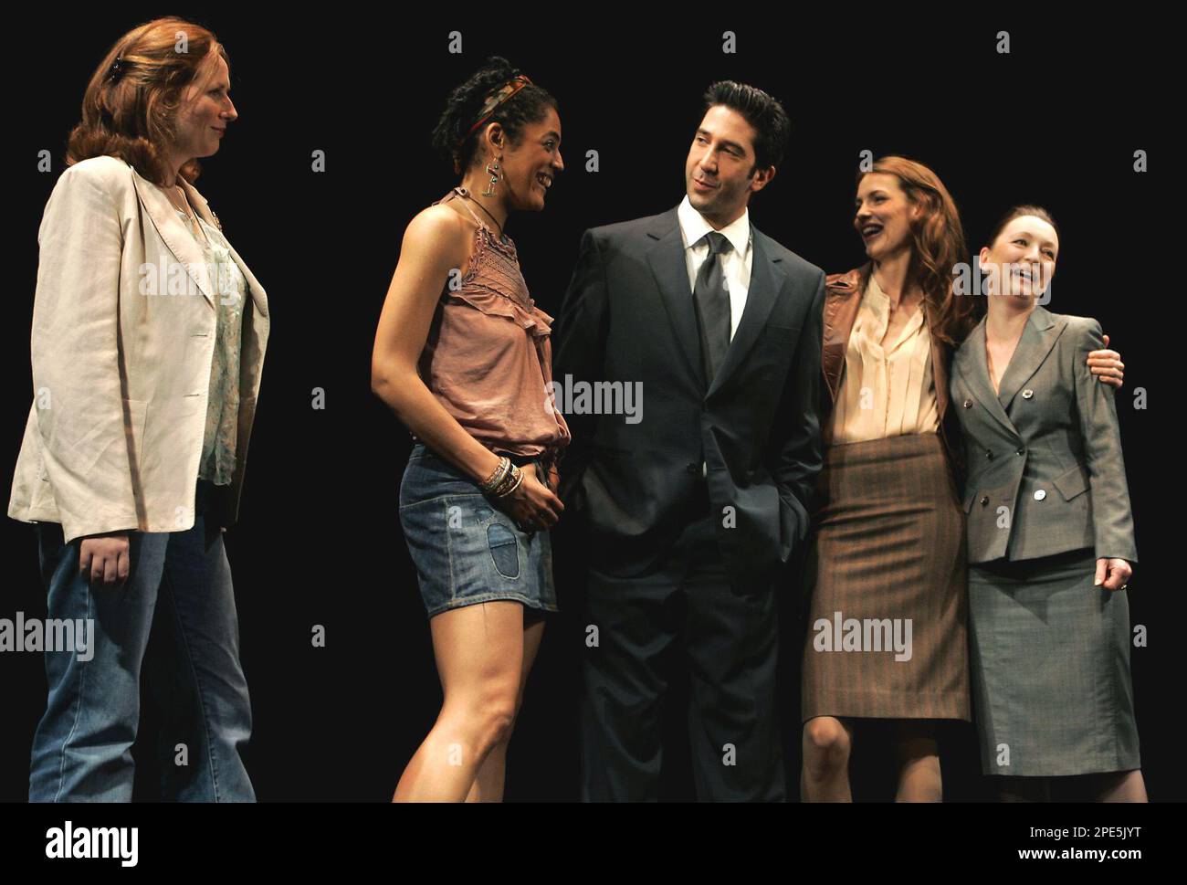 U.S. actor David Schwimmer, centre, poses for photographs on stage with ...