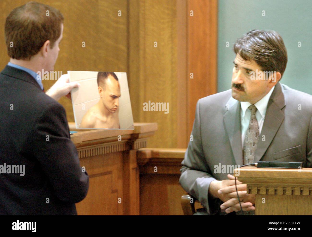 Special Prosecutor Morley Swingle, left, shows Columbia Police ...