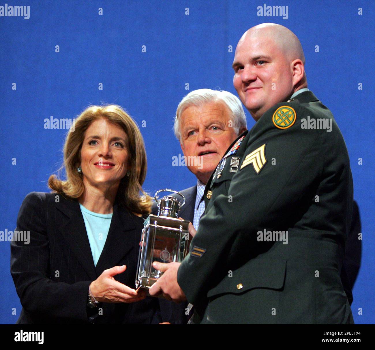 U.S. Army Sgt. Joseph Darby, right, receives a special Profile in ...