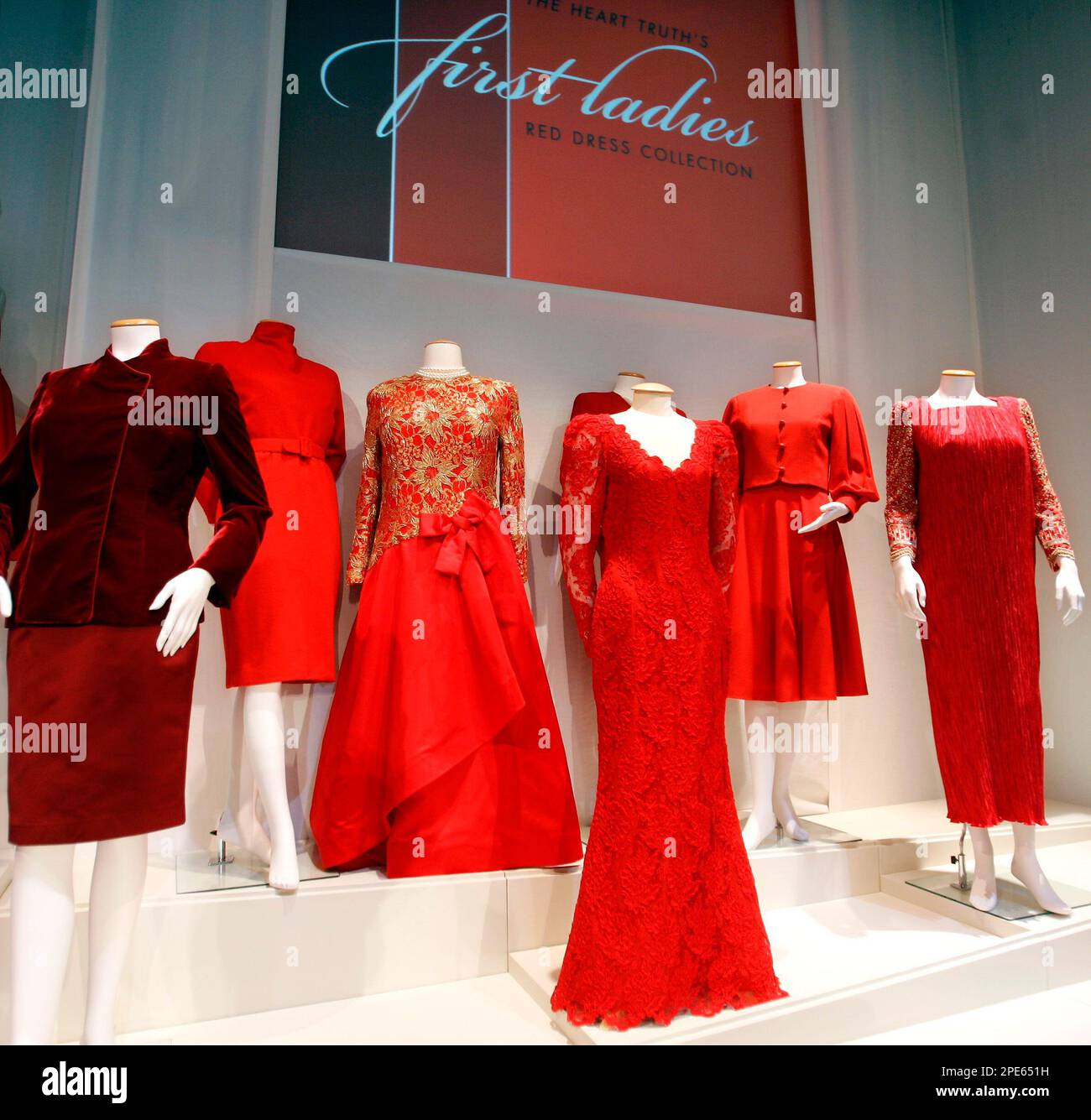 A display of red gowns, dresses and suits worn by first ladies since ...