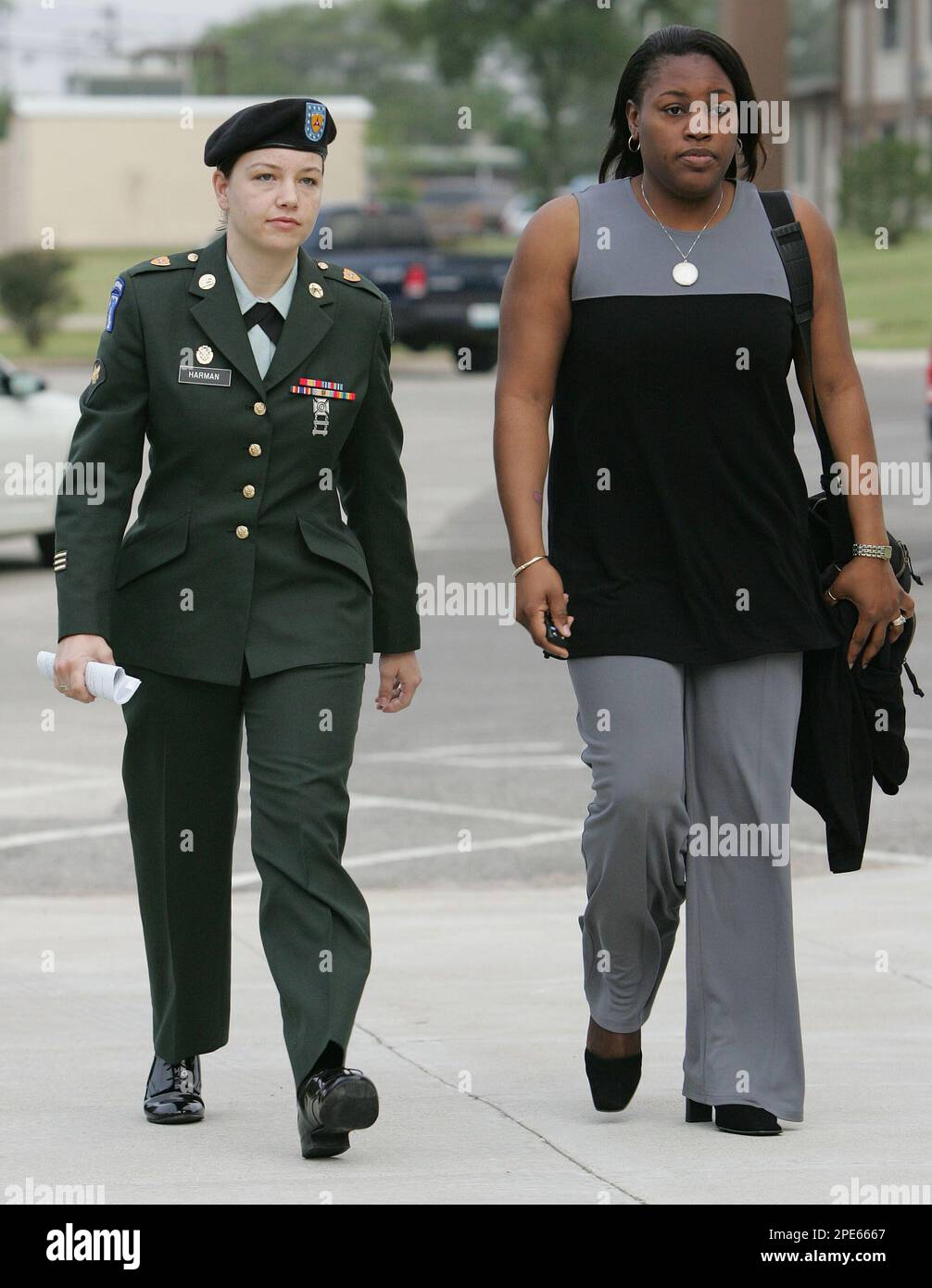 Spc. Sabrina D. Harman, left, and Sgt. Davida McGriff, a member of her ...