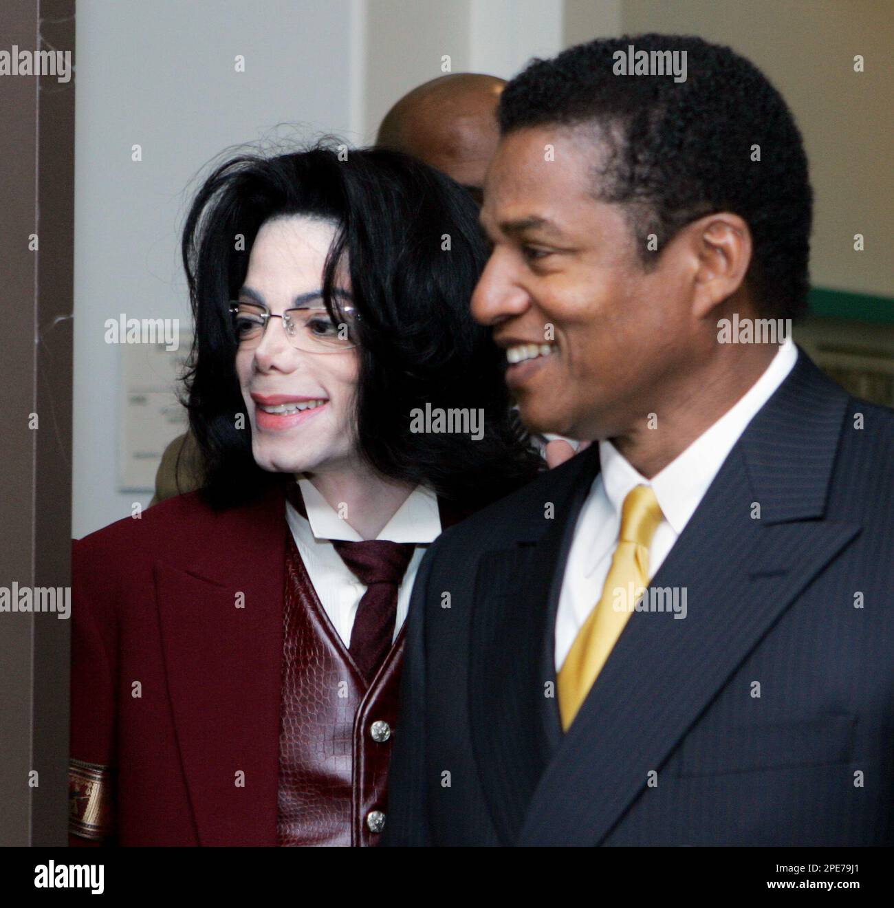 Michael Jackson and his brother Jackie Jackson, right, smile as they re ...