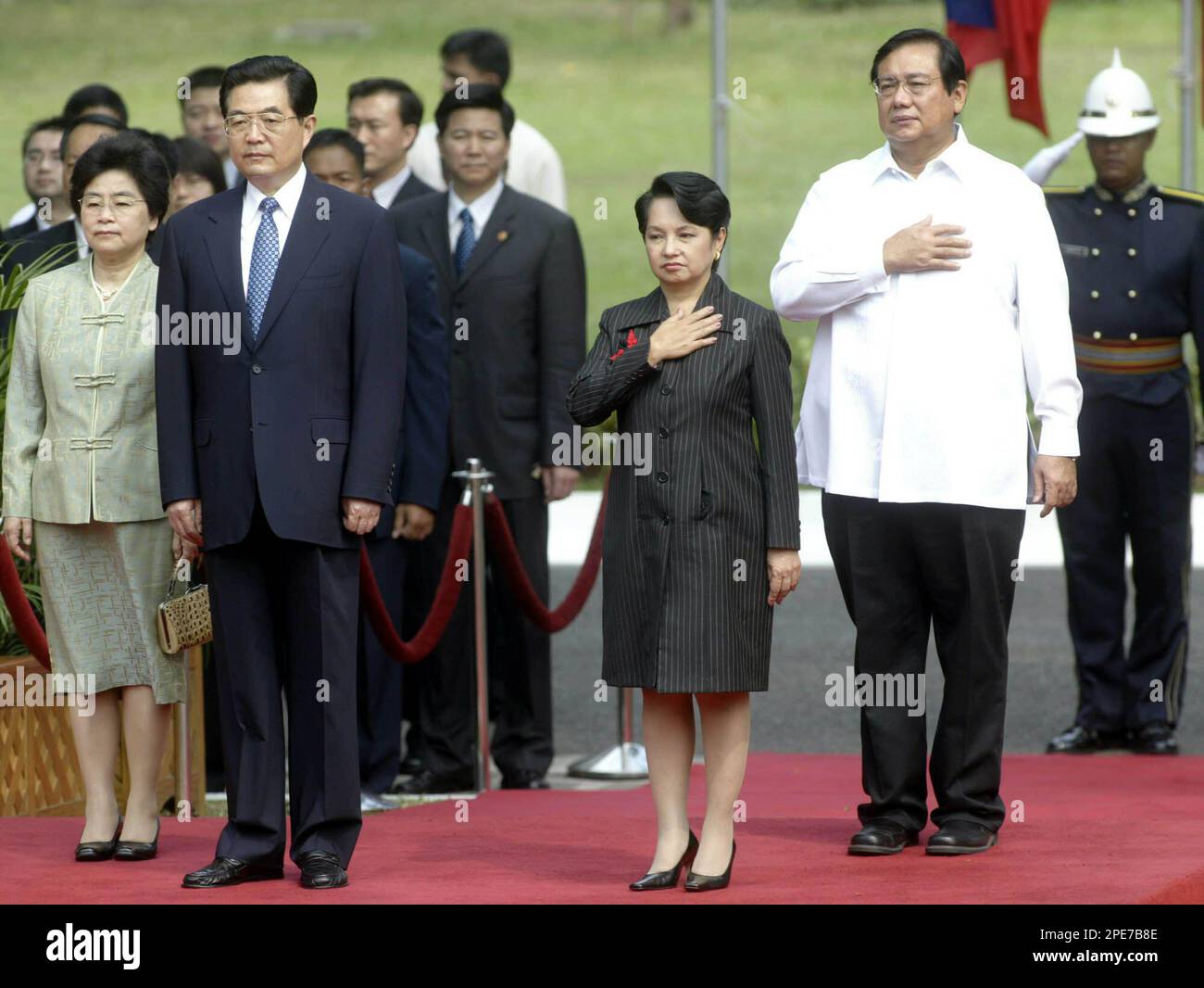 Chinese President Hu Jintao and First Lady Madame Liu Yongqing, front ...