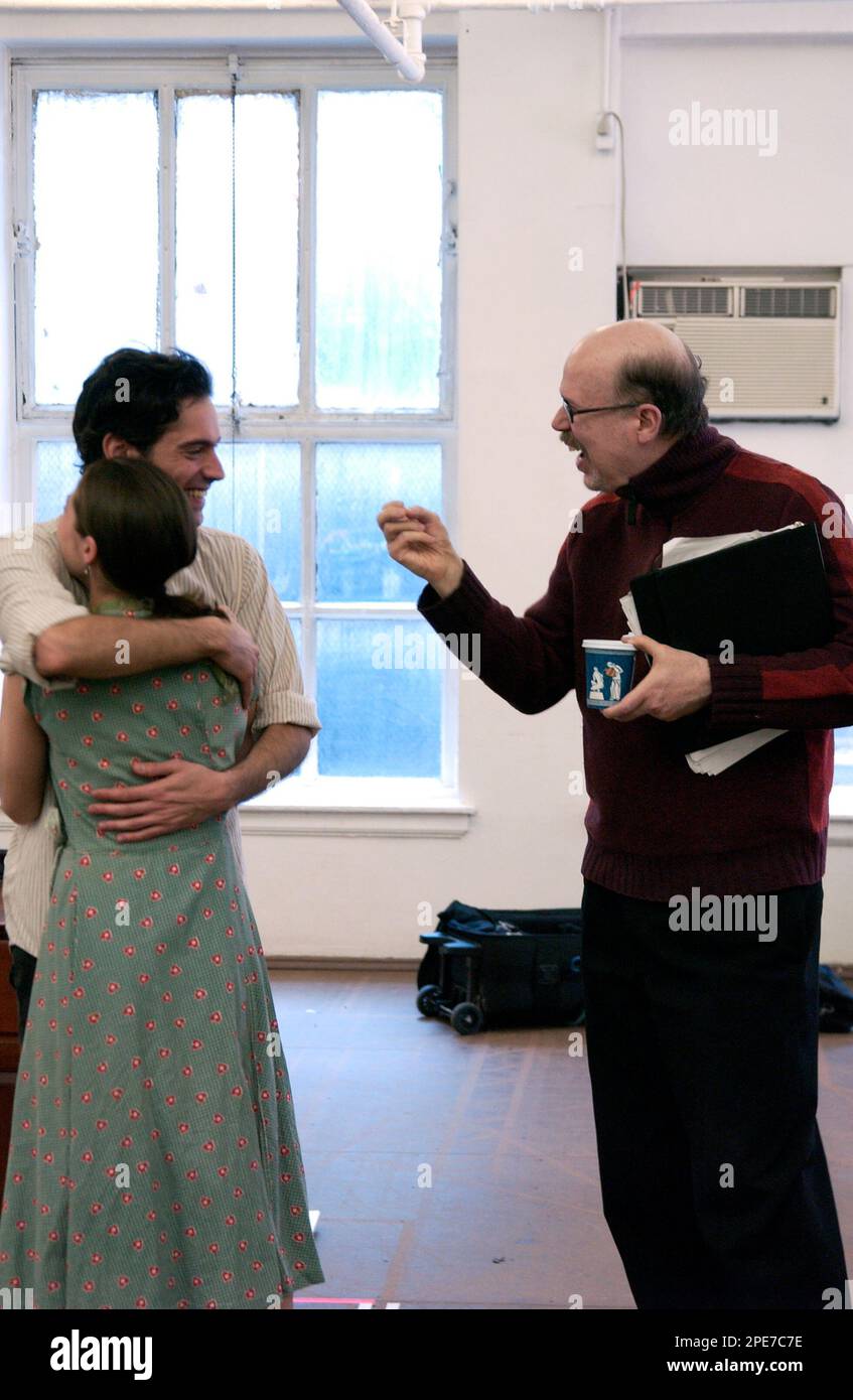 Actors Omar Metwally, left facing camera, and Lena Georgas work with ...
