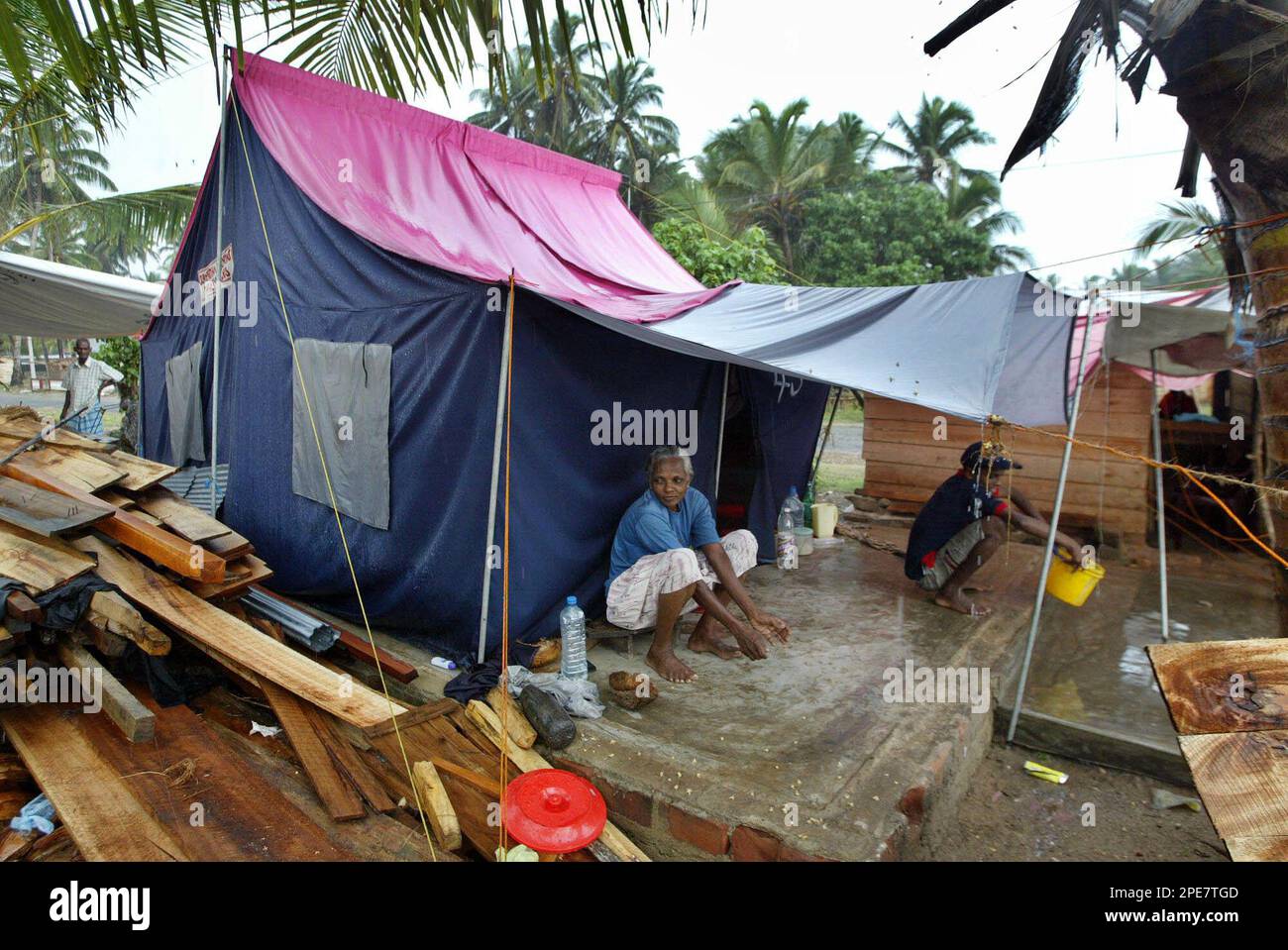 ** ADVANCE FOR Sunday, April 24 **Tsunami survivors Ksumalatha, left ...