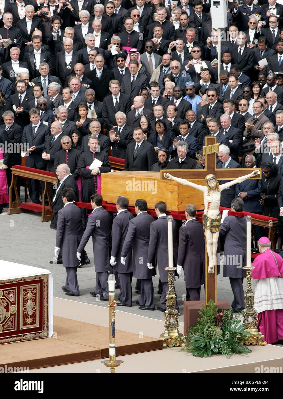 Pope John Paul II's coffin is carried past heads of government, state ...
