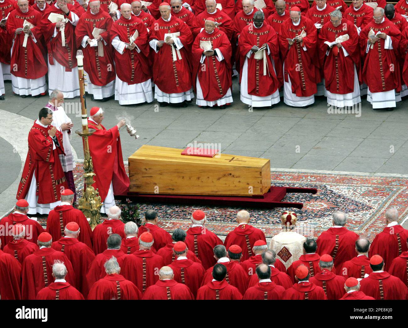 German Cardinal Joseph Ratzinger blesses the casket of Pope John Paul ...