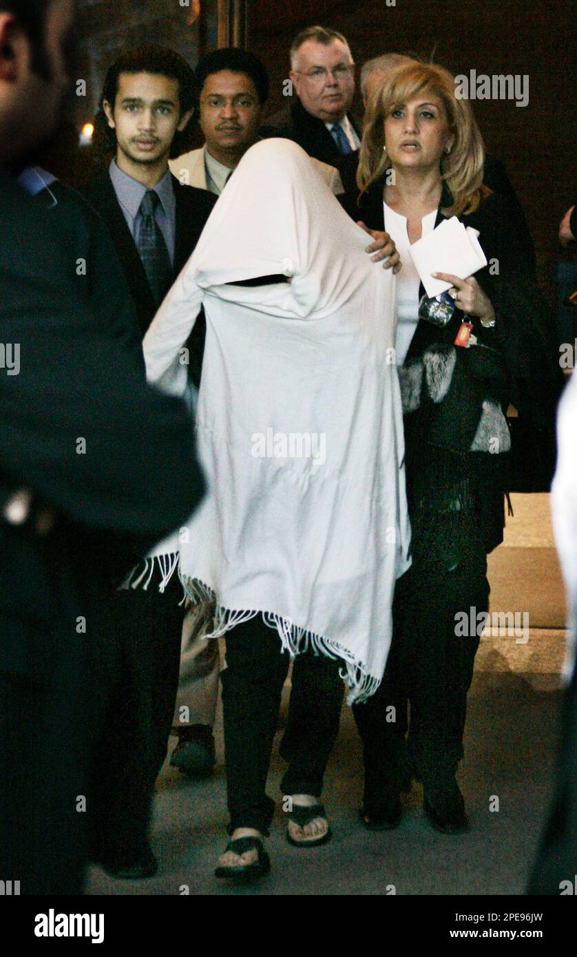 Hana Al Jader, 39, a Saudi princess, is draped in a white blanket, and ...