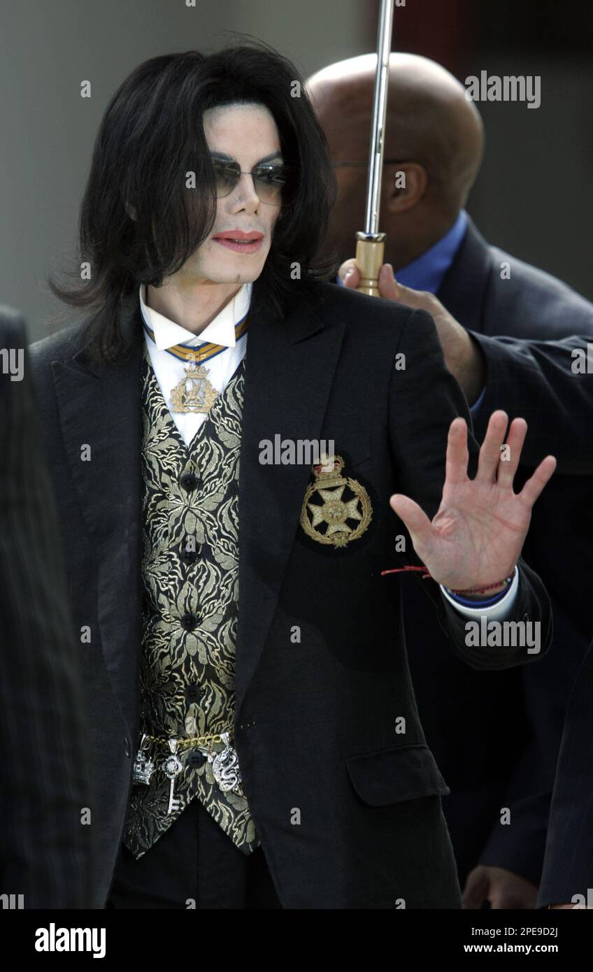 Michael Jackson waves as he leaves the Santa Maria, Calif., courthouse ...