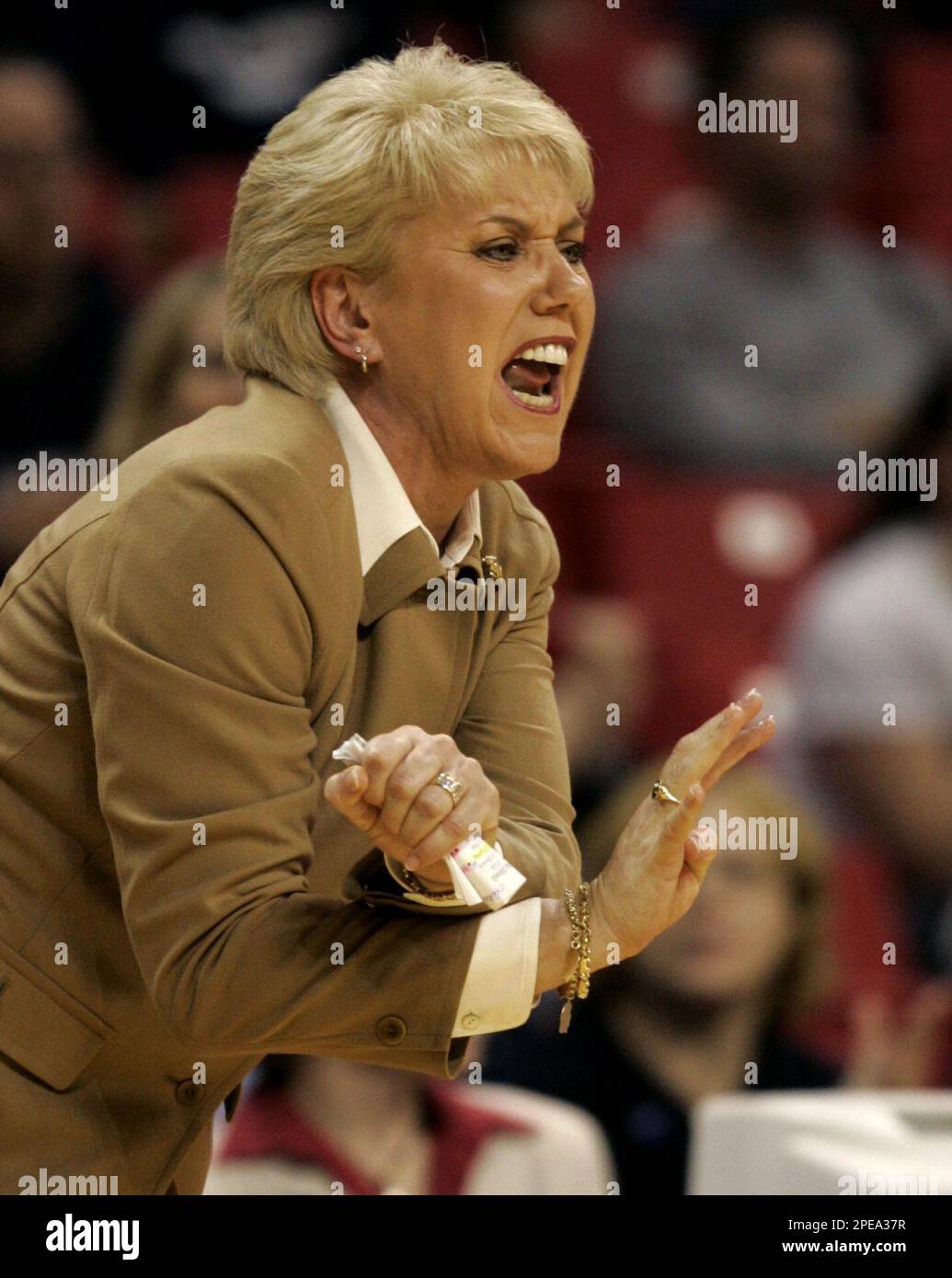 Penn State coach Rene Portland communicates with her team during the ...