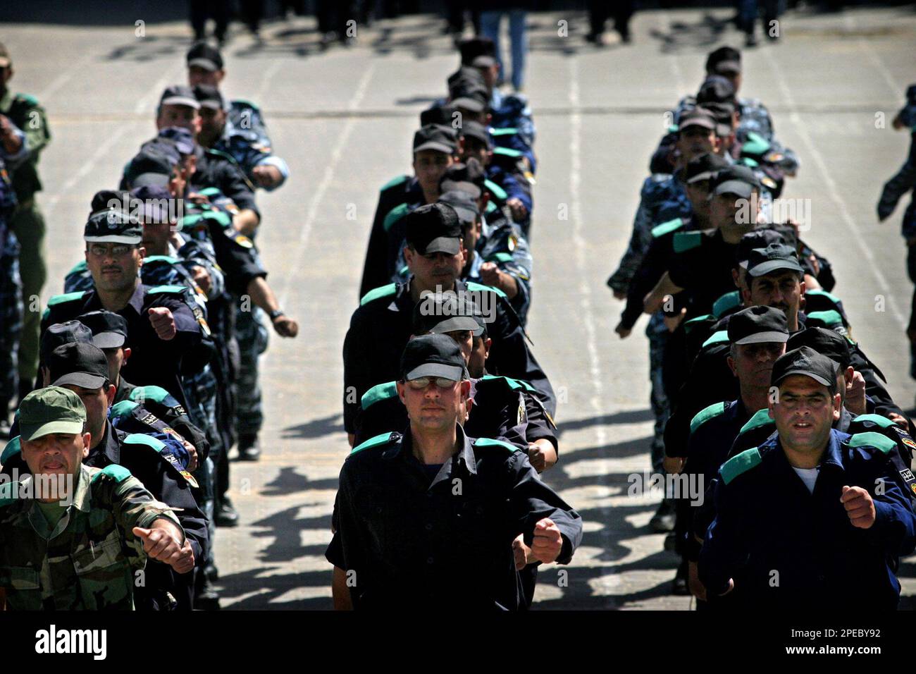 Palestinian police officers are seen in formation at their barracks in ...