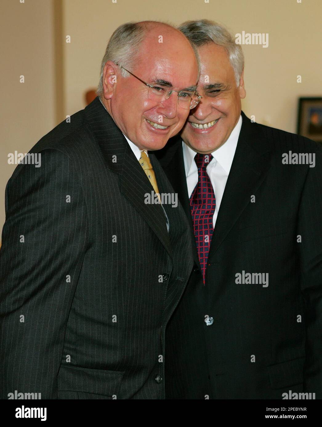 Israeli President Moshe Katsav, right, laughs with Australian Prime ...