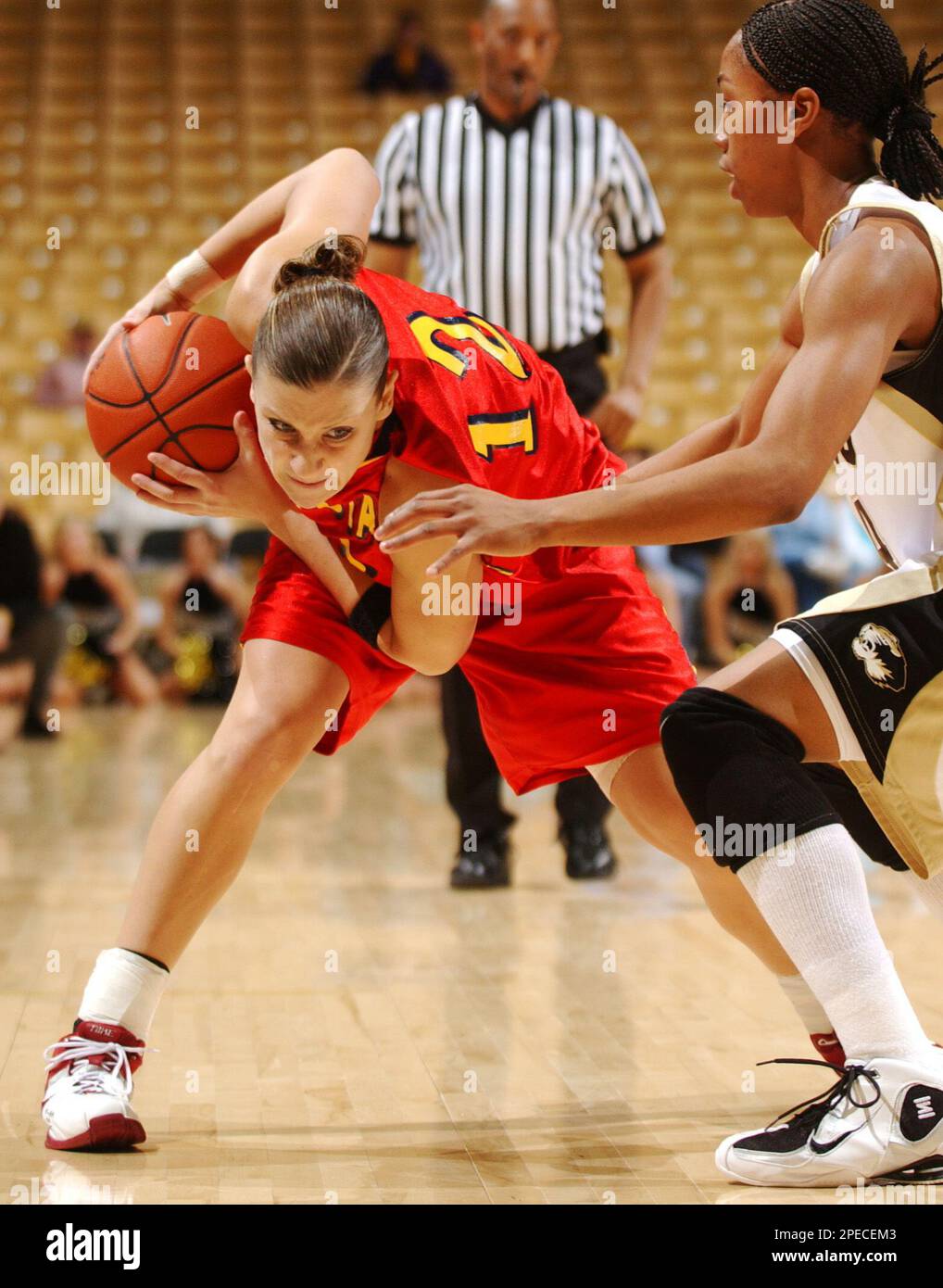 Iowa State's Anne O'Neil, left, pulls the ball away from Missouri's ...