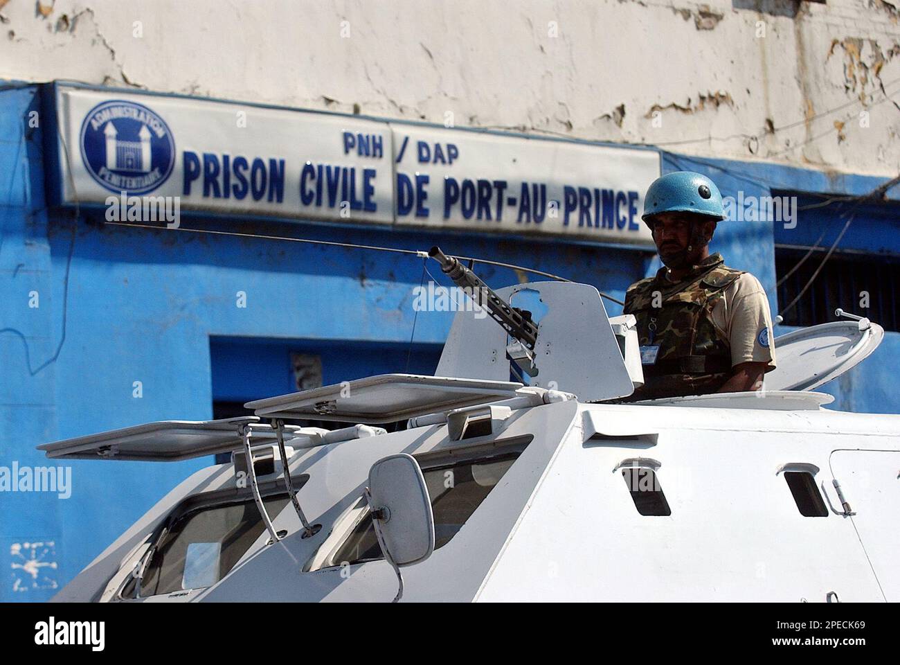 A U.N. peacekeeper from Pakistan stands guard outside the Haitian Civil ...