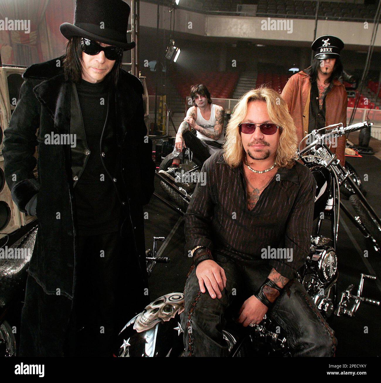 Rock group Motley Crue, from left, Mick Mars, Tommy Lee, Vince Neil and ...