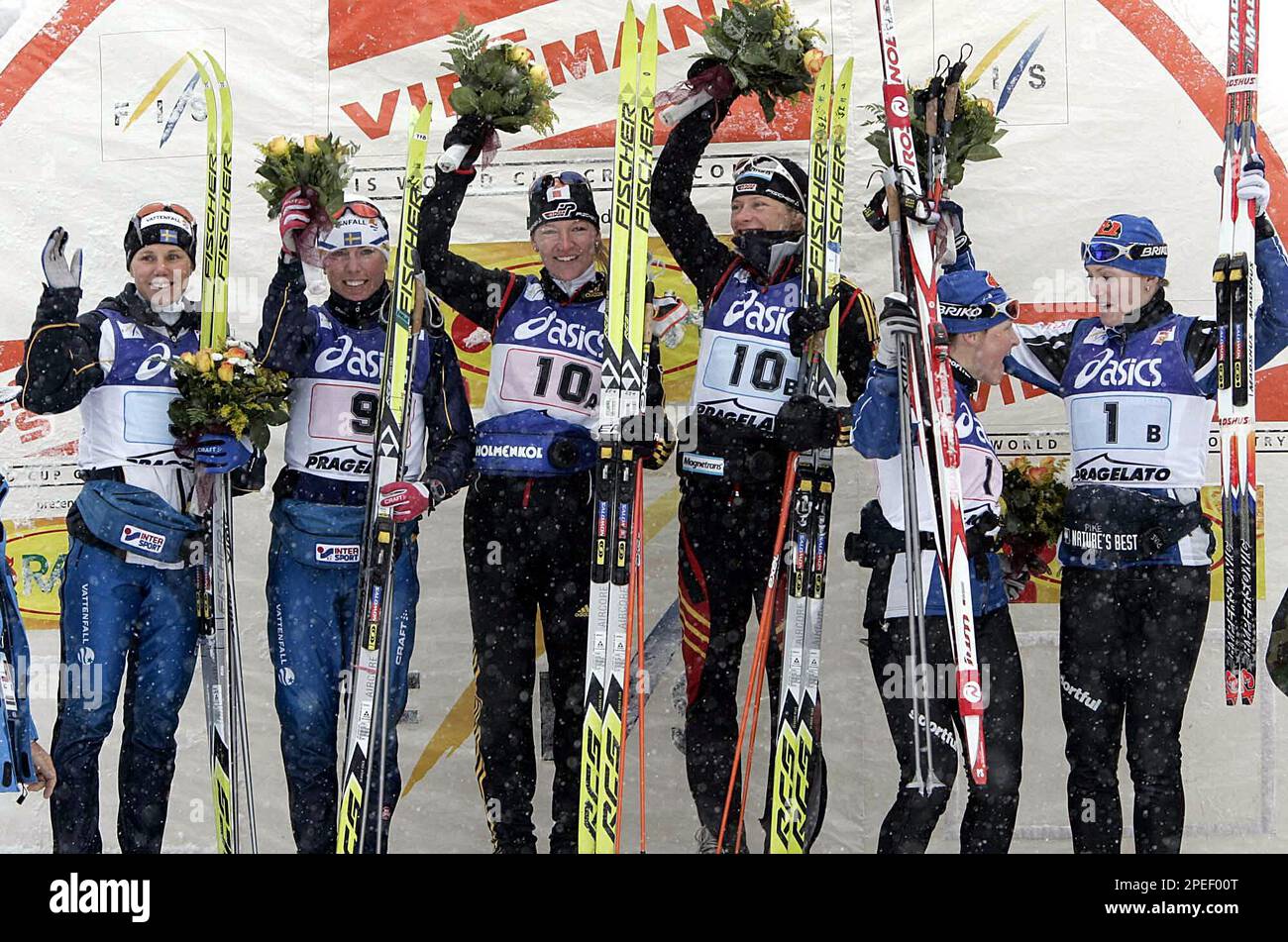 From left, on podium, Sweden's Anna Dahlberg and Emelie Oehrstig ...