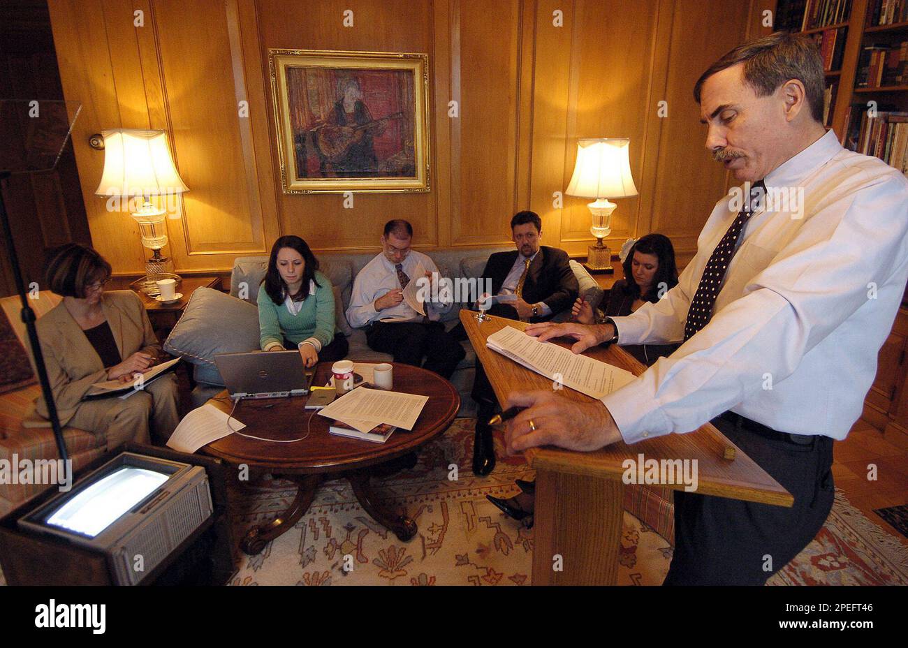 West Virginia Gov. Bob Wise, right, works on the finishing touches to ...