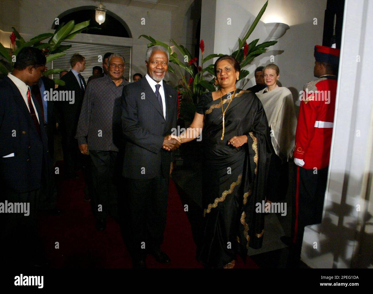 UN Secretary Kofi Annan, left, is greeted by Sri Lankan President ...