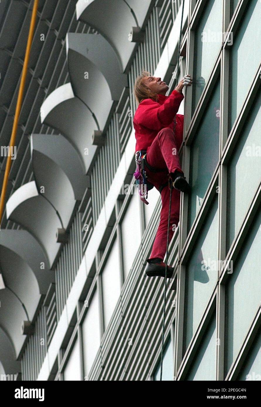 French urban climber Alain Robert, a.k.a. the French Spiderman, scales ...