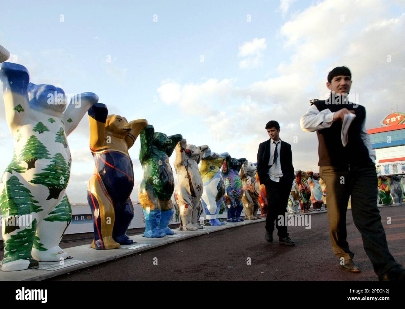 A Turkish high school student looks at a column of 'Buddy Bears' in ...